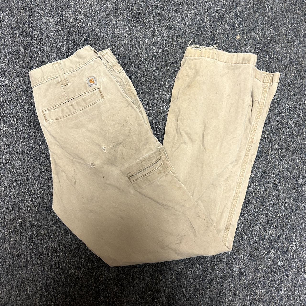 Distressed Khaki Carhartt Pants sz. 33x32 - Depop