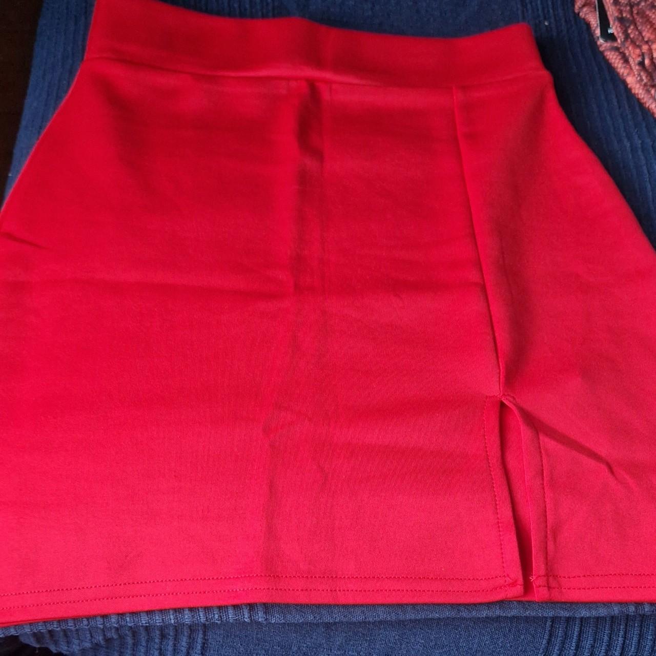 Missguided red miniskirt with slit Worn... - Depop