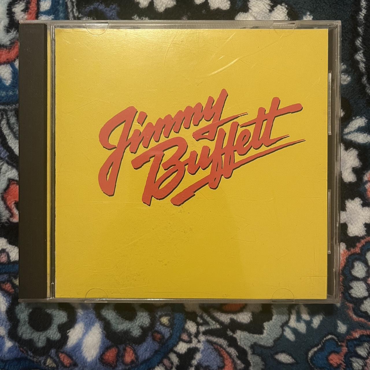Jimmy Buffett CD! Never played by me but has been... - Depop