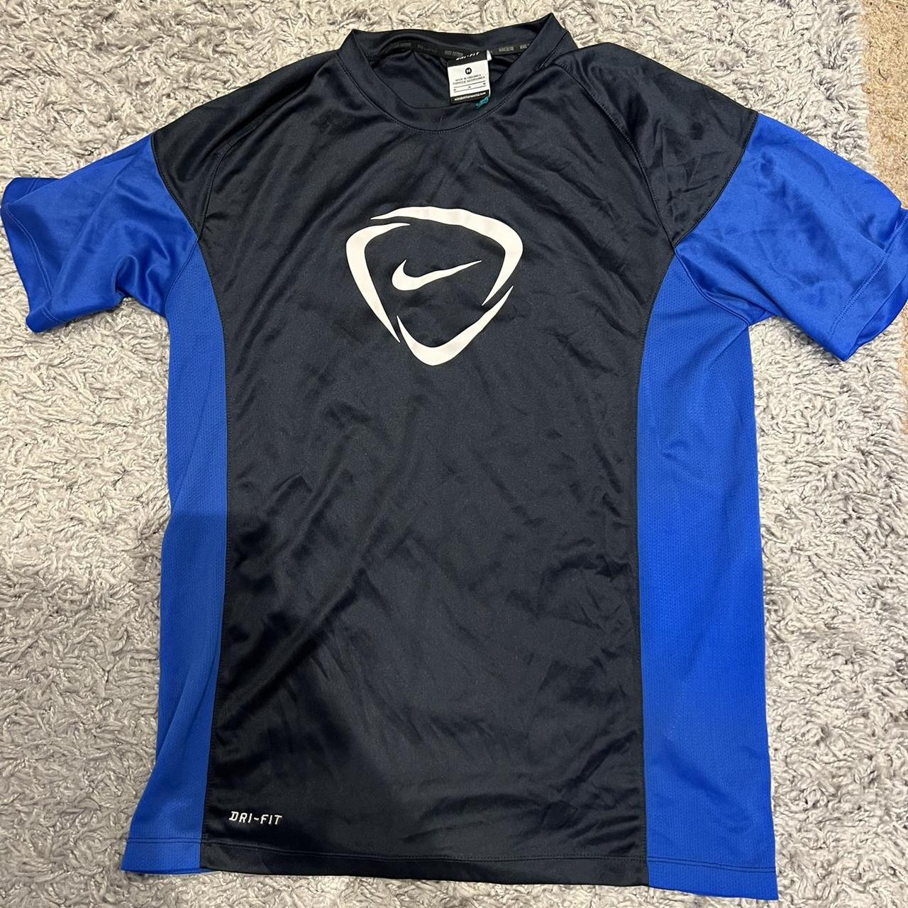 Nike Centre Swoosh Logo Dri-fit T-Shirt in Blue and... - Depop