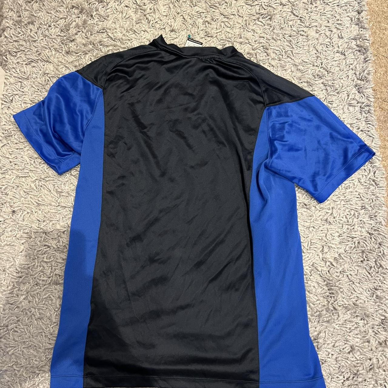 Nike Centre Swoosh Logo Dri-fit T-Shirt in Blue and... - Depop