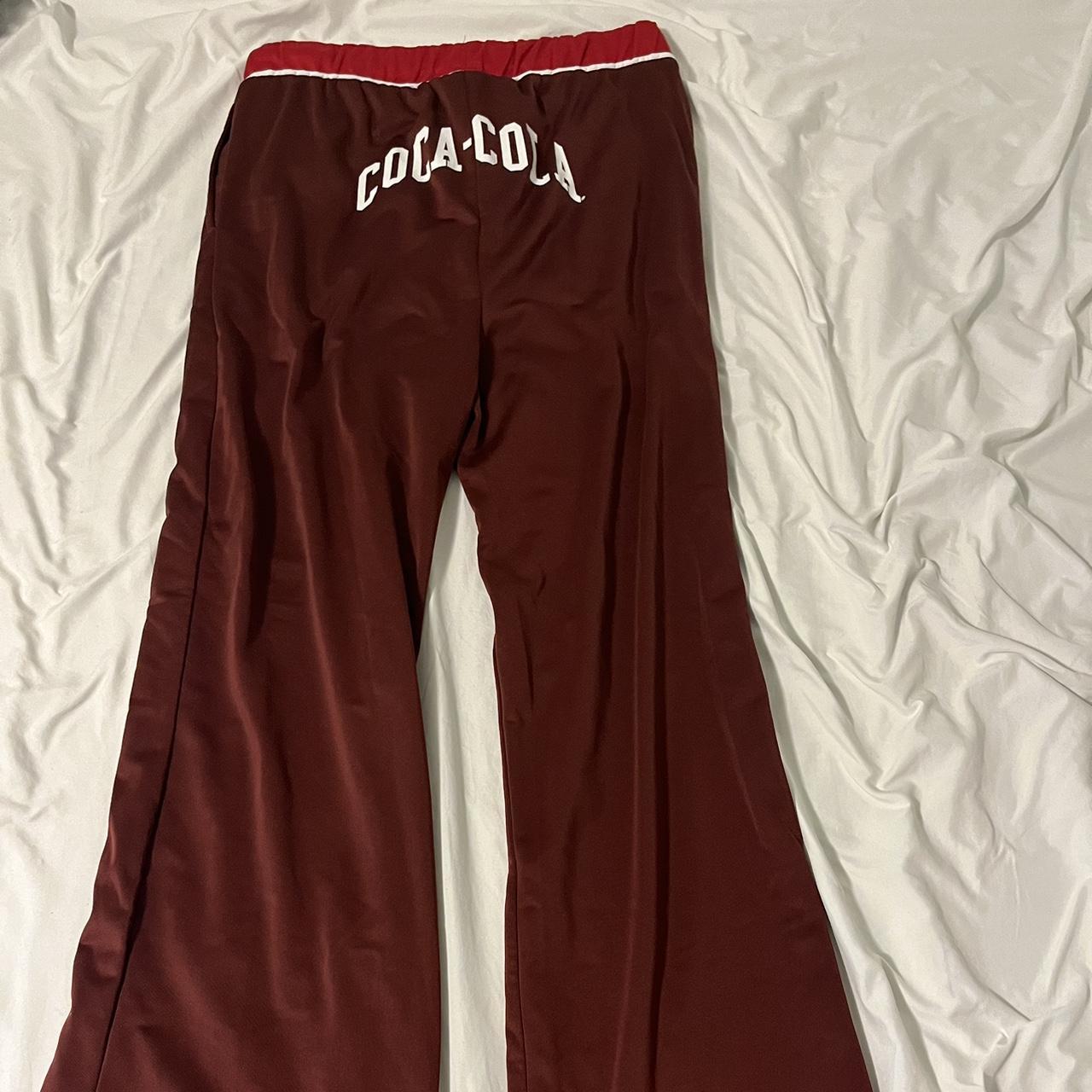 Red and Burgundy Coca Cola track pants - Depop