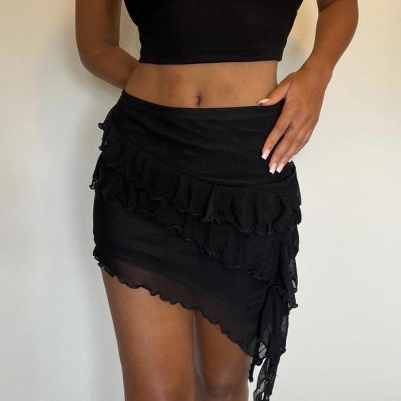 Black mini ruffle skirt Asymmetrical design Model... - Depop