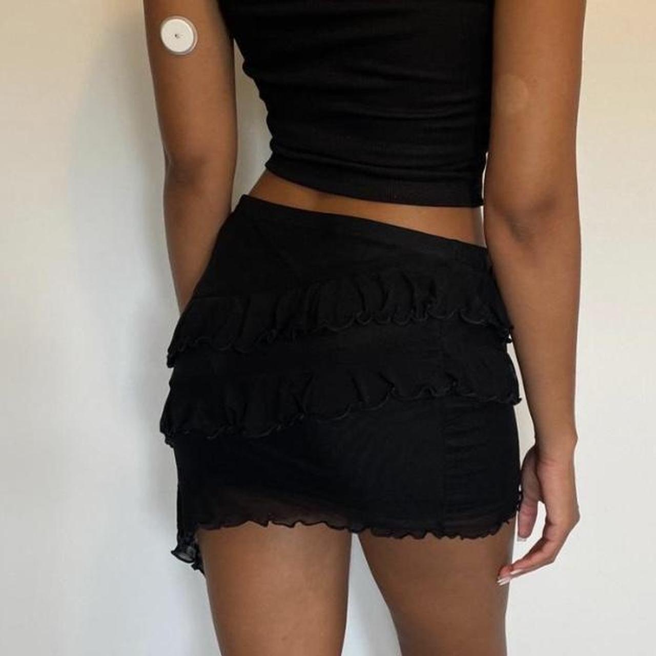 Black mini ruffle skirt Asymmetrical design Model... - Depop