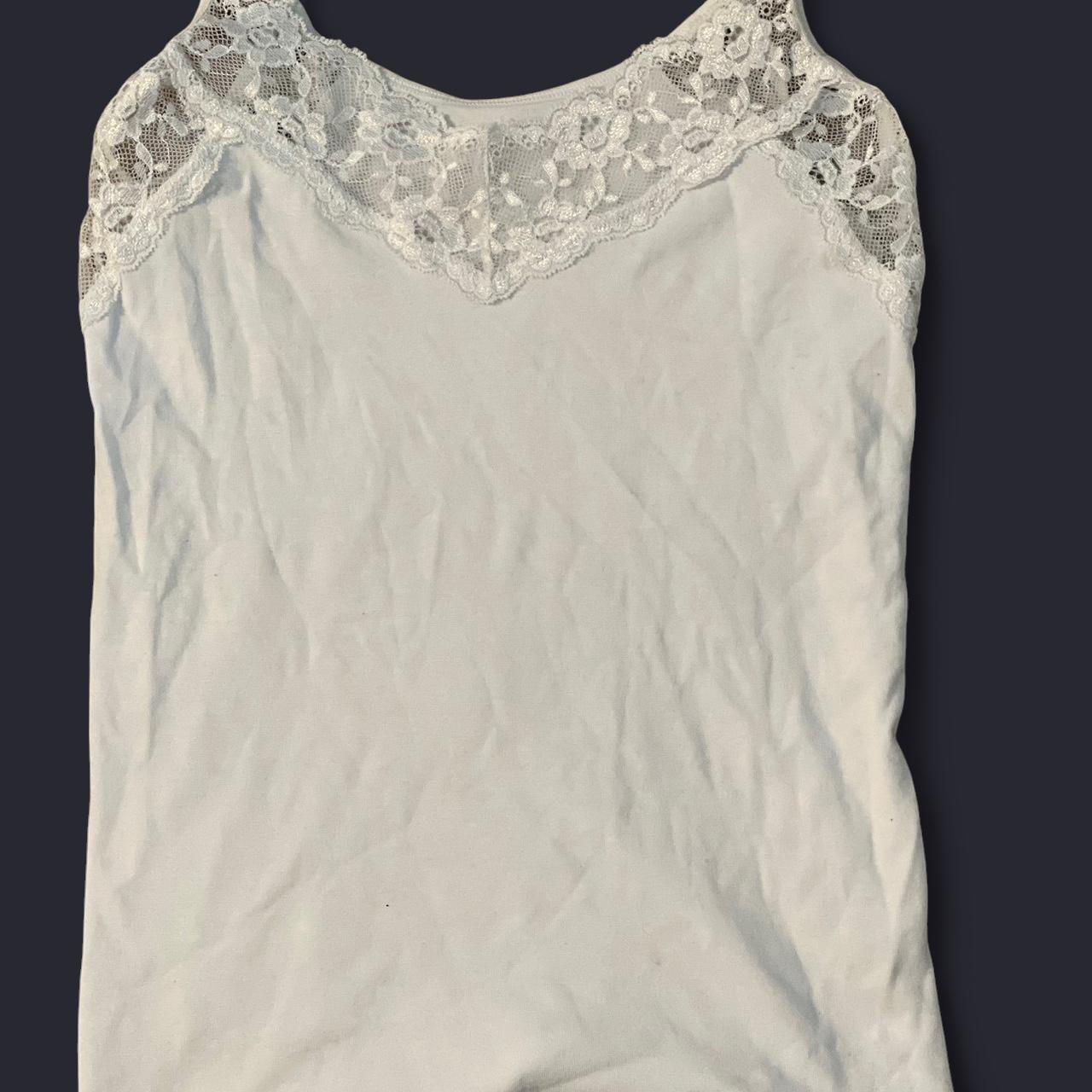 White lace tank top with a touch of fairy charm... | Depop