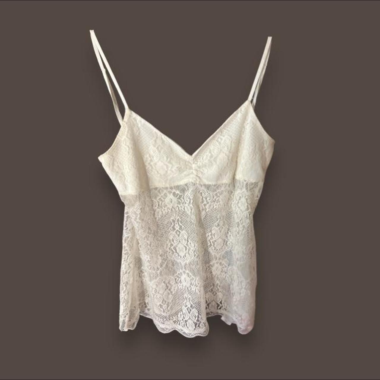 White lace tank top with see through bottom. Fits a... - Depop