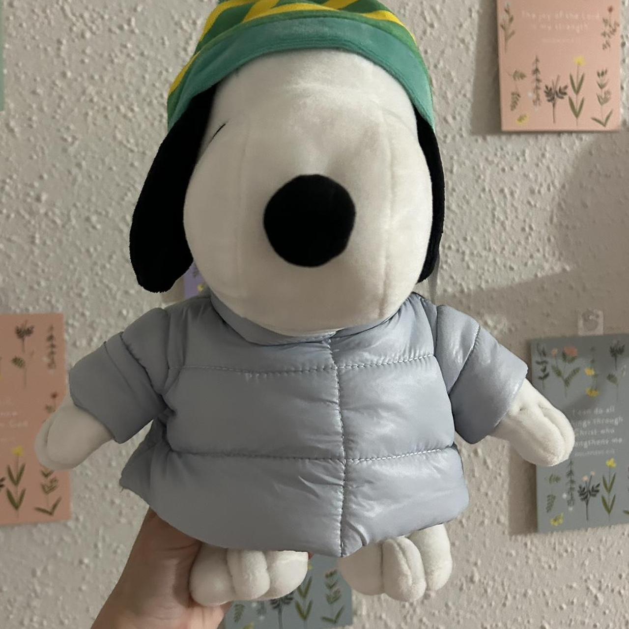 Puffer Snoopy Doll new with tag has minor flaw as... - Depop