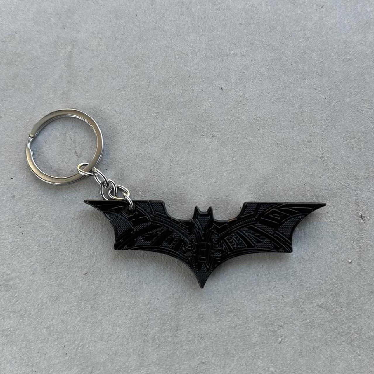 y2k black batman symbol logo batarang keychain... - Depop