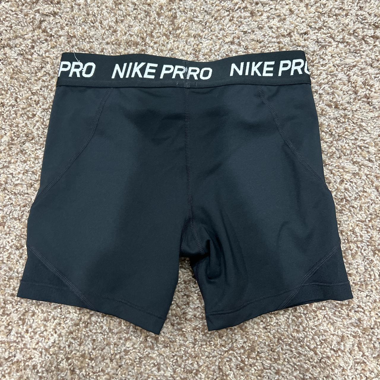 Black nike pros never worn size large in older kids... | Depop