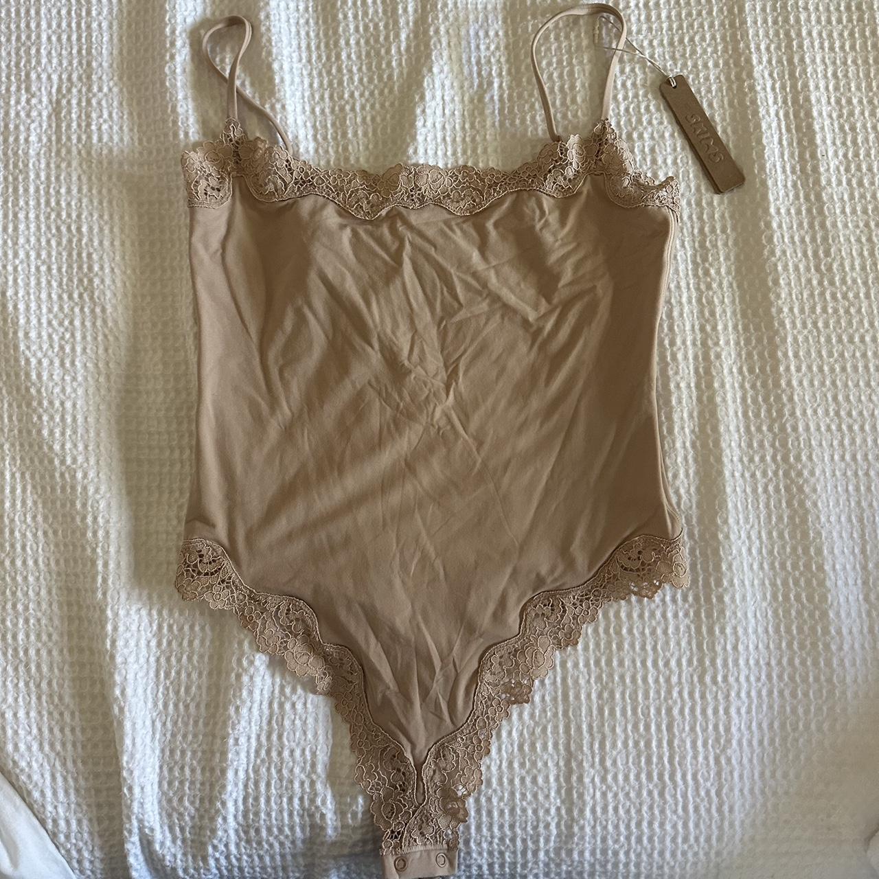 Skims bodysuit in the color clay! Brand new with... - Depop