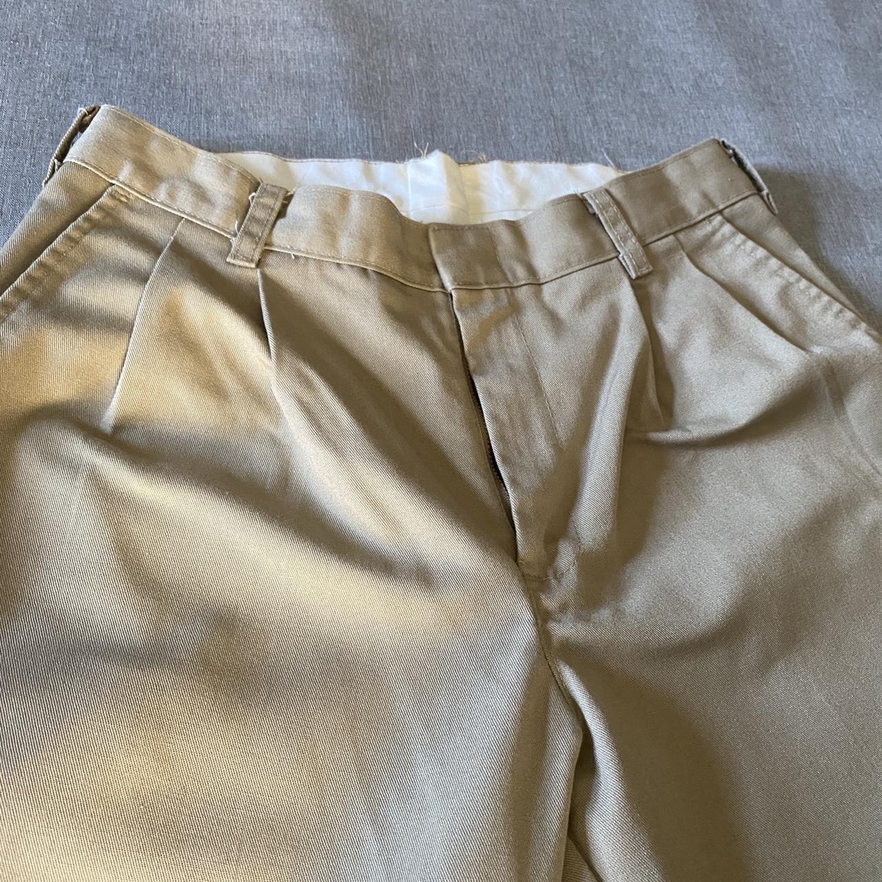 Khaki pleated pants. Size is 28x30. has a straight... - Depop