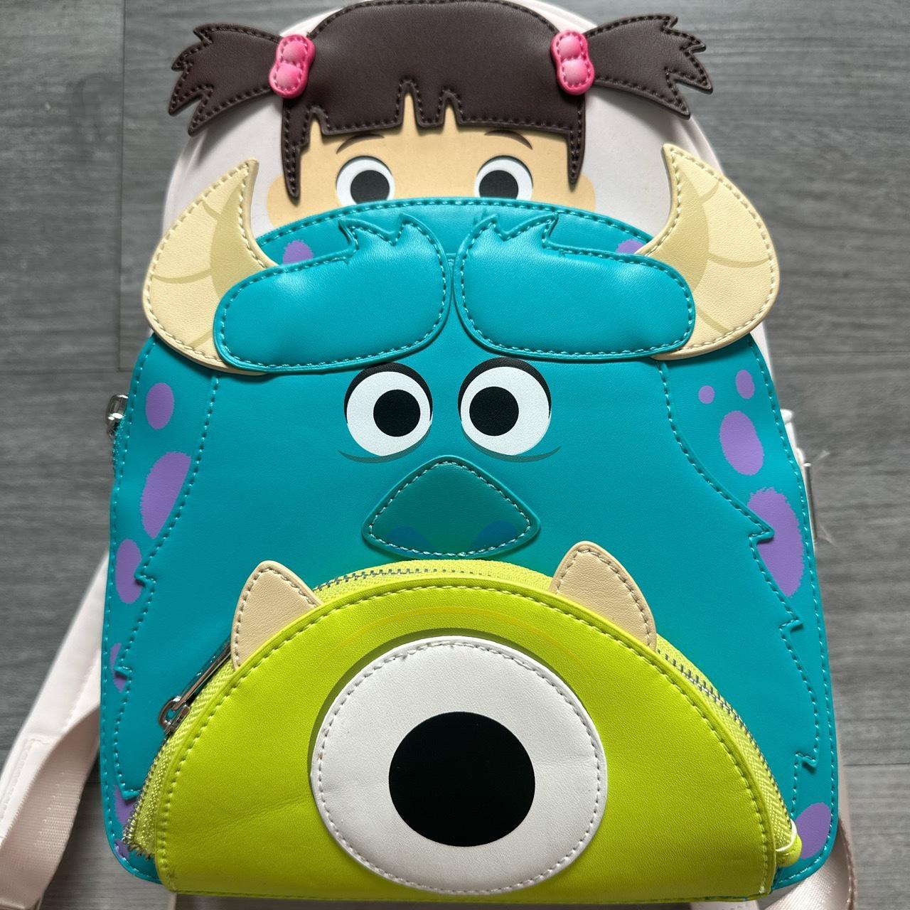 Pixar Monster Inc loungefly, there is a small mark... - Depop