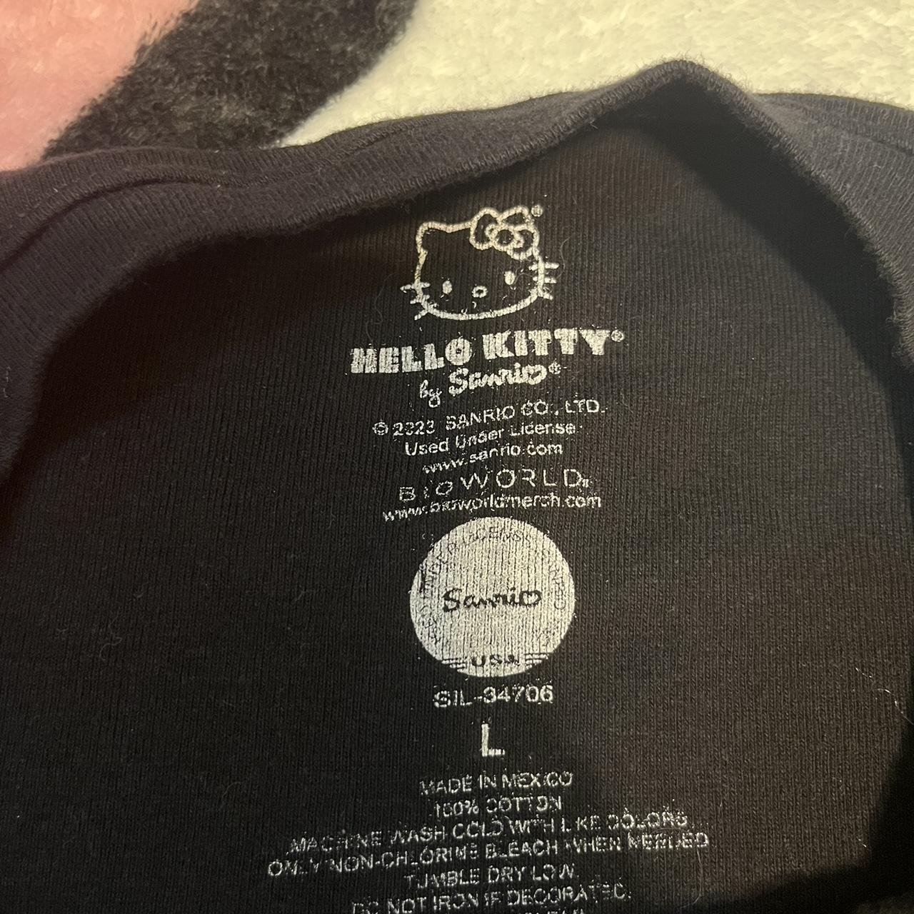 Hello Kitty Crop top Flaws are the bleach stains on... - Depop