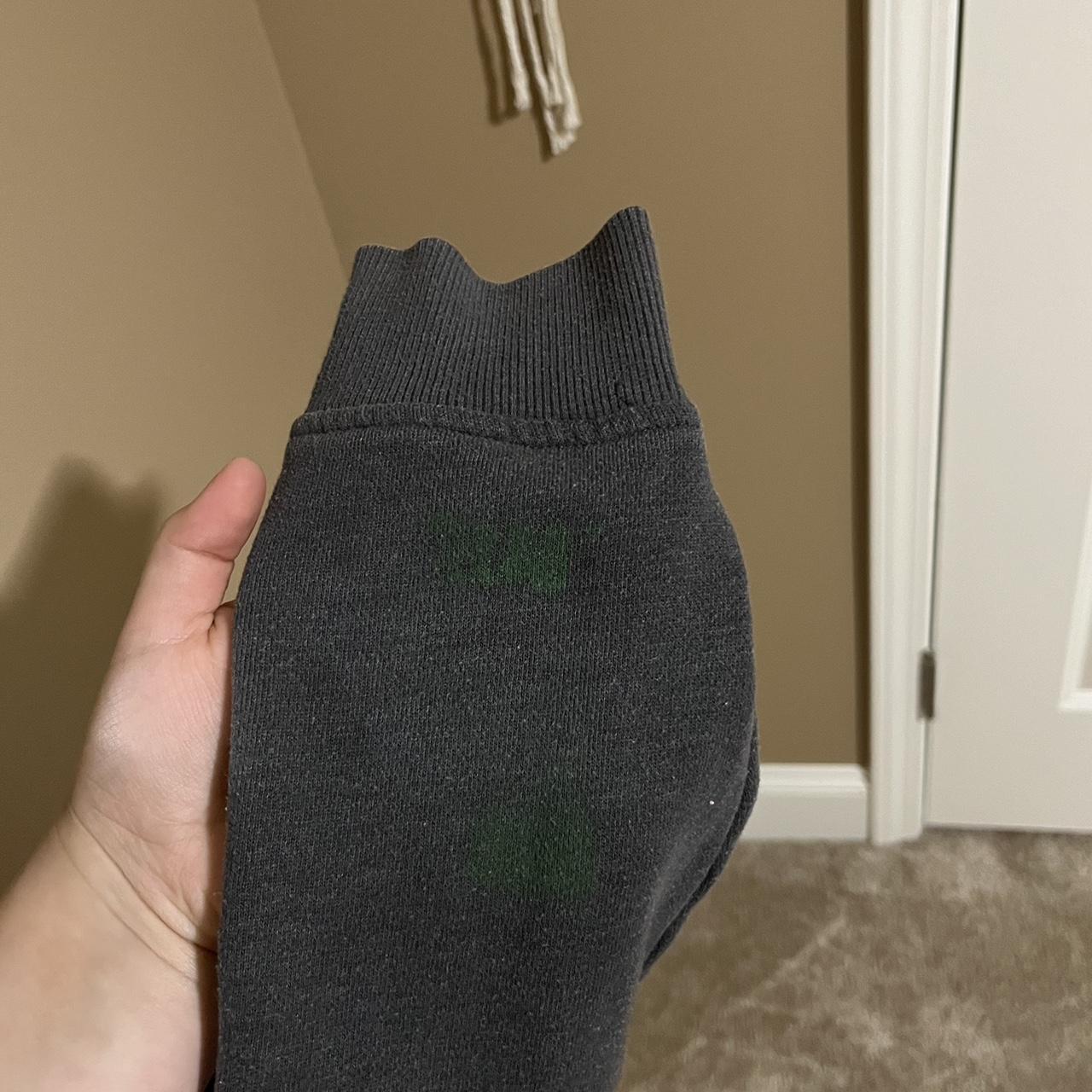 dark grey half zip! paint stain on sleeve - Depop