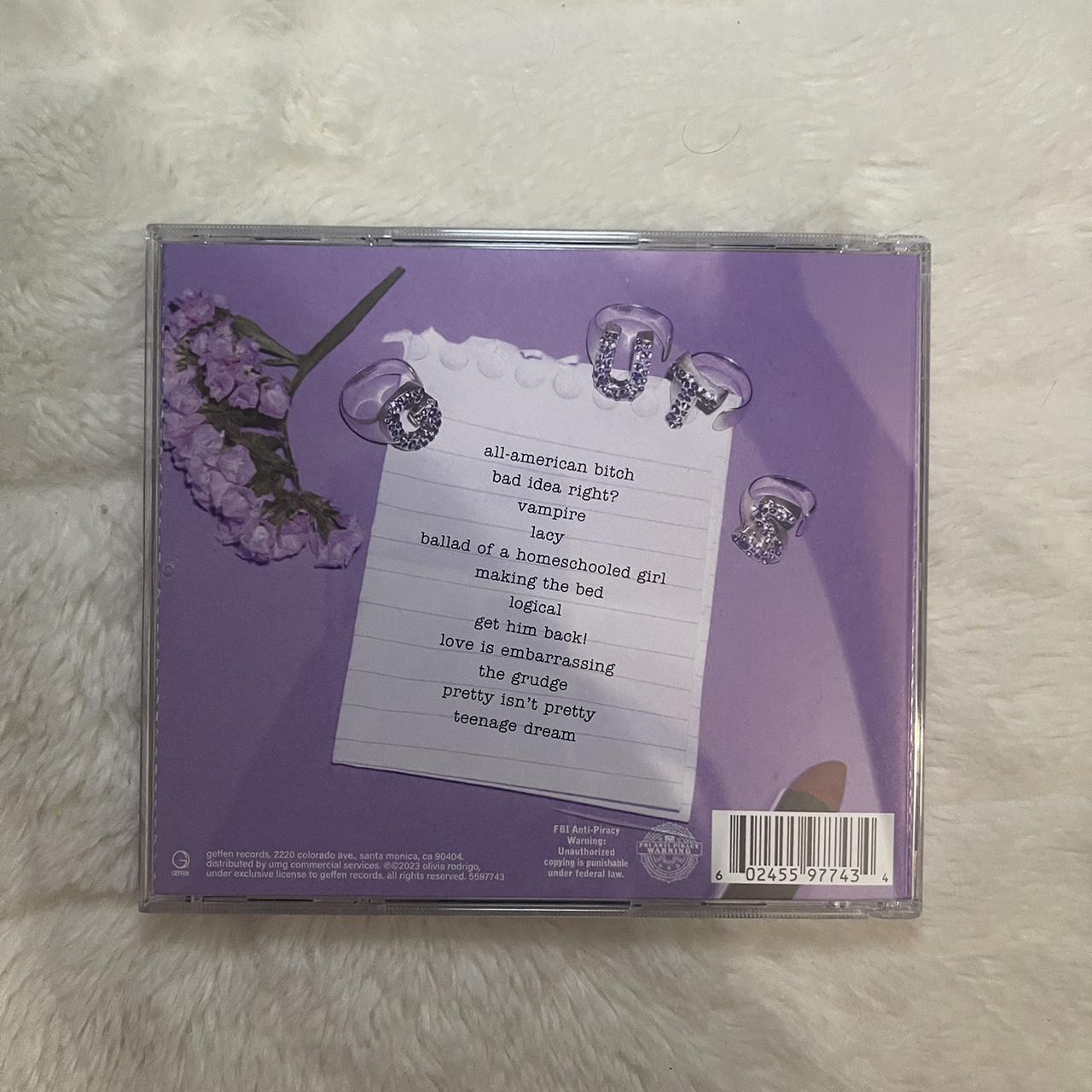 Signed Olivia Rodrigo "guts" cd target exclusive... - Depop