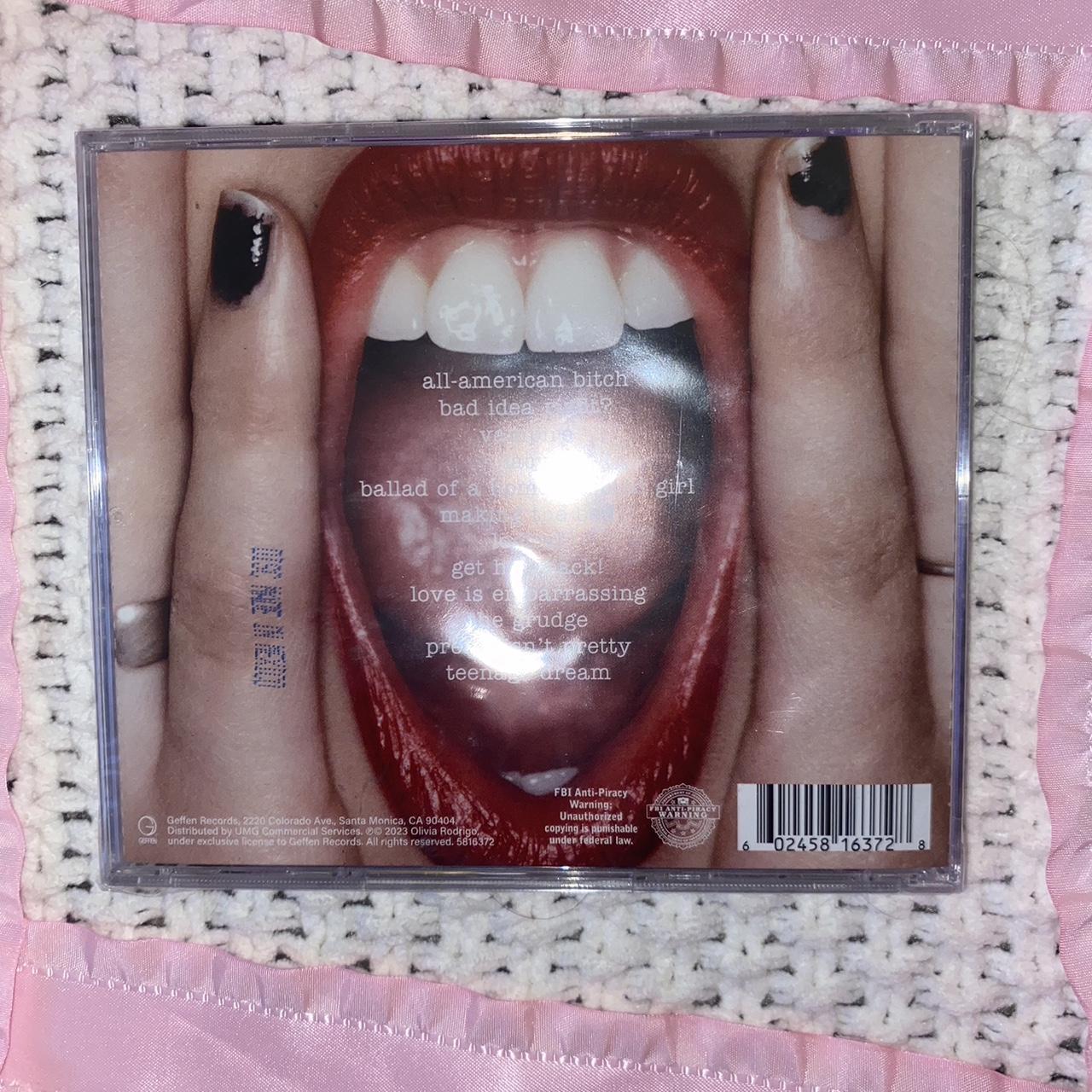 🧛‍♀️Olivia Rodrigo GUTS CD BRAND NEW never removed from... - Depop