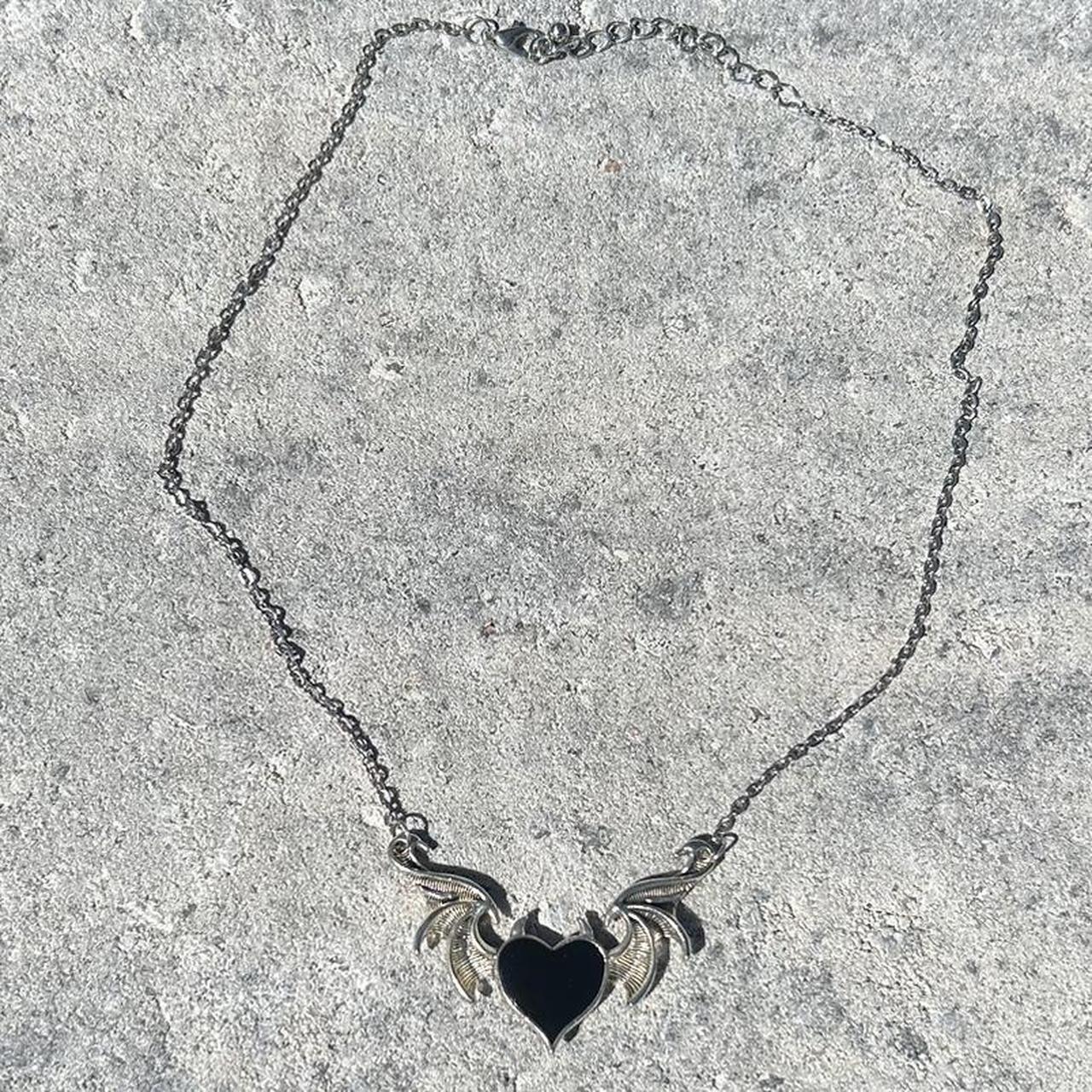 ⋆.˚vampire heart with wings #emo #grunge #fairy... - Depop