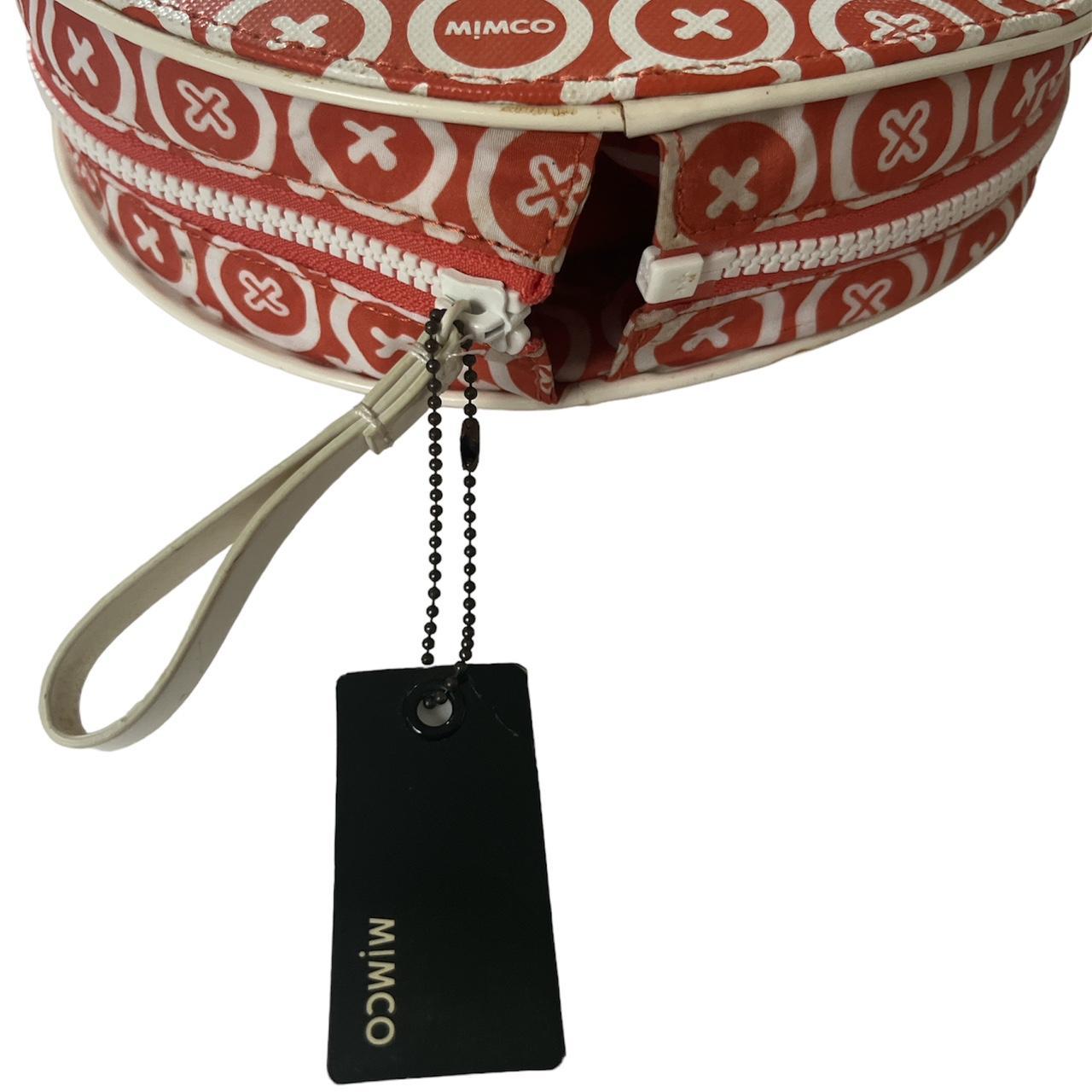 Mimco packable. Zips into a round disc and unzips... - Depop