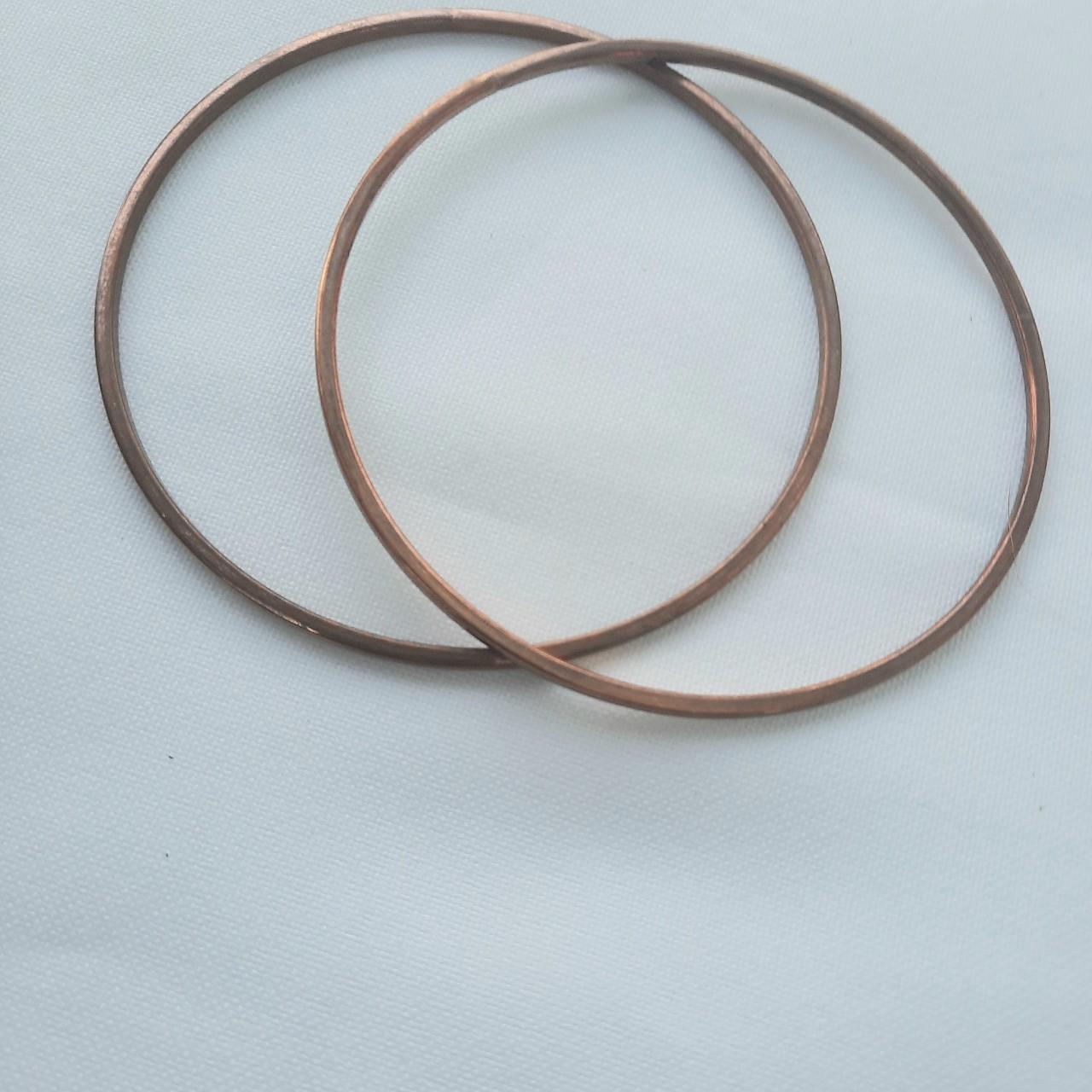 Two thin vintage copper bangles, fits larger... - Depop