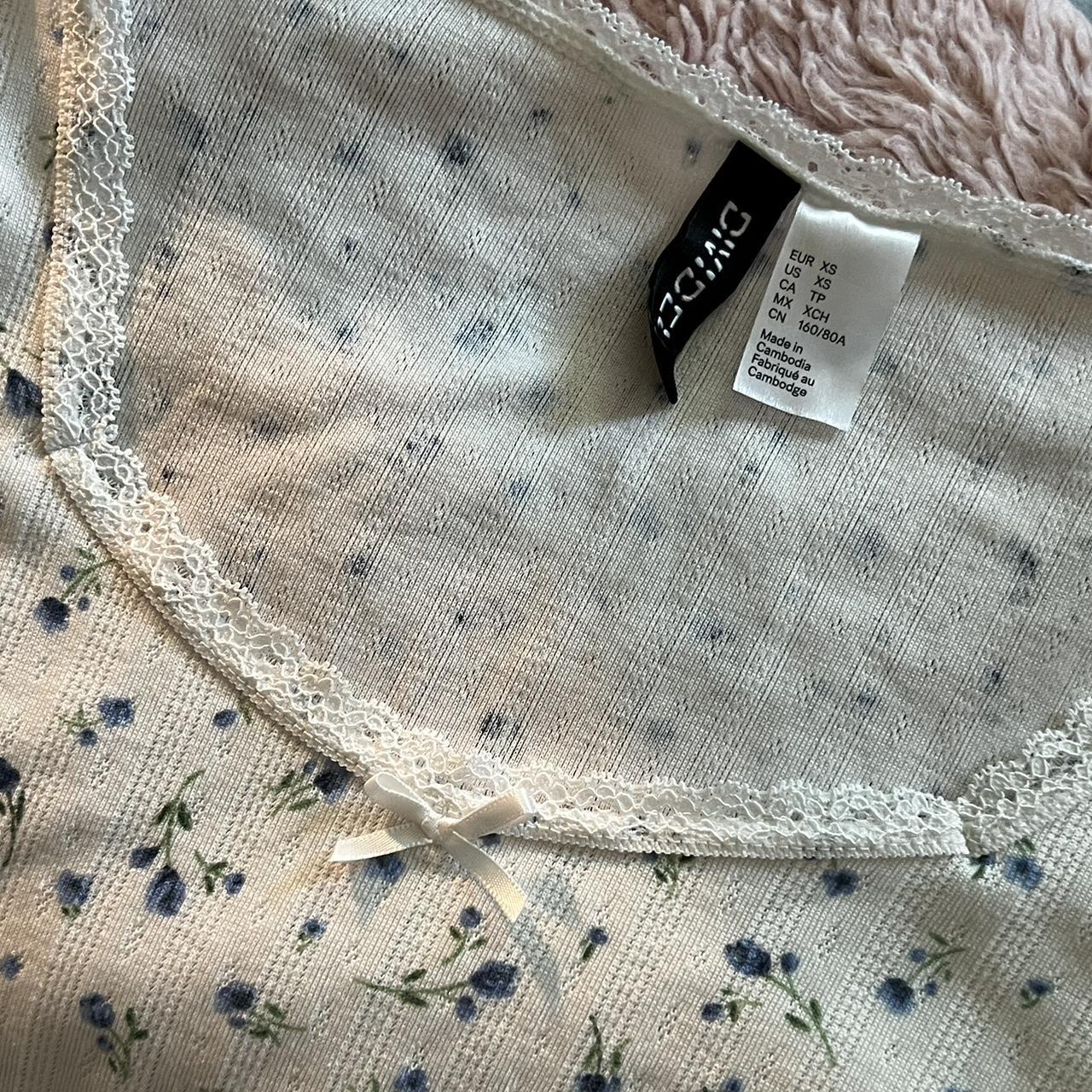 Coquette floral long sleeve top with a square neck... - Depop