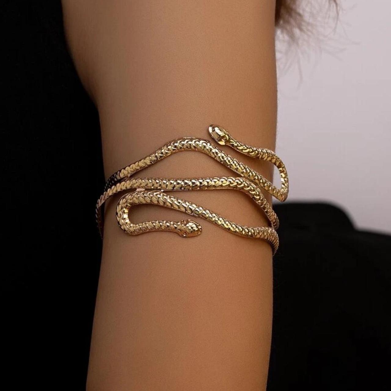 Gold snake arm cuff. Brand new. Bought for a costume... - Depop