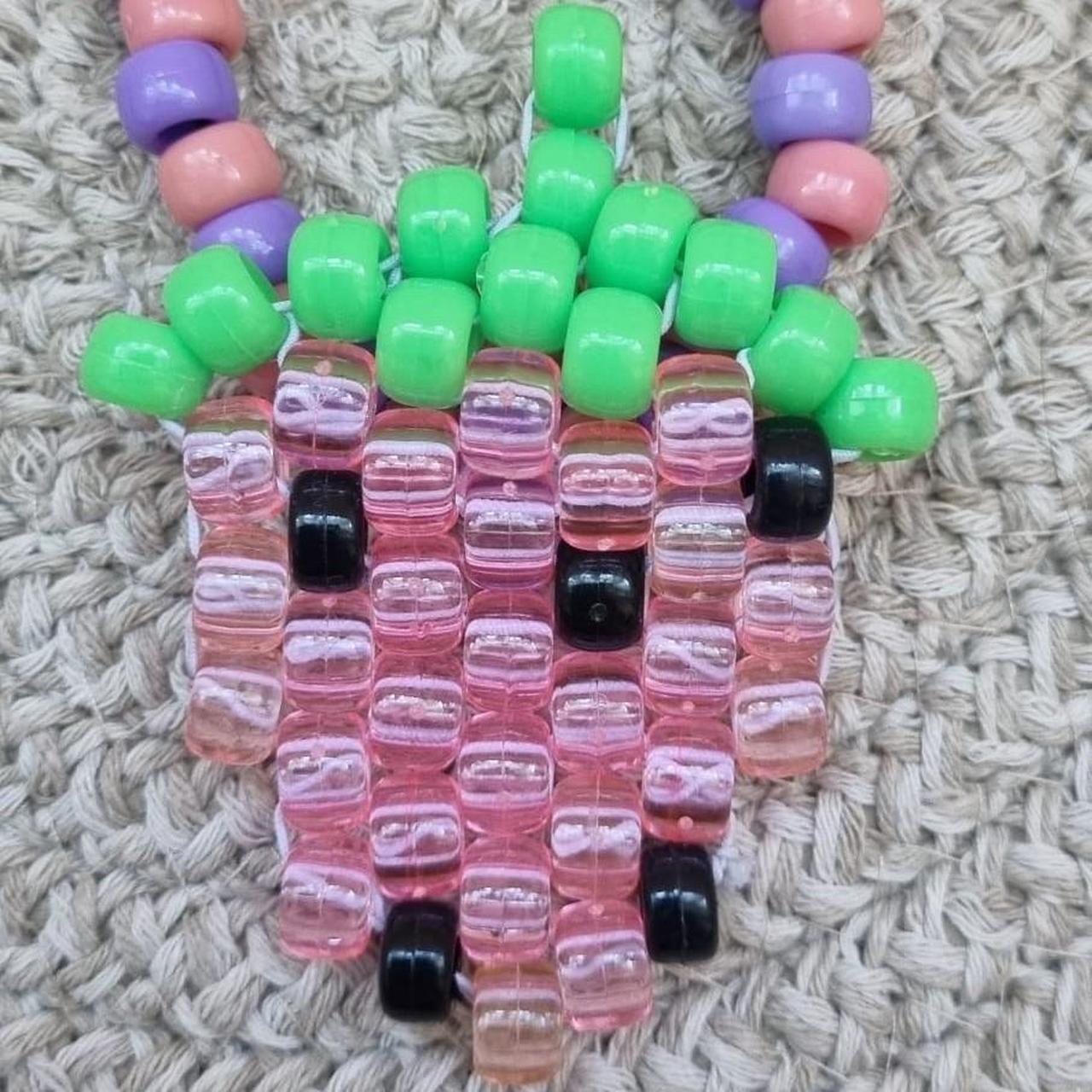 Handmade pink and purple kandi bracelet with large... - Depop