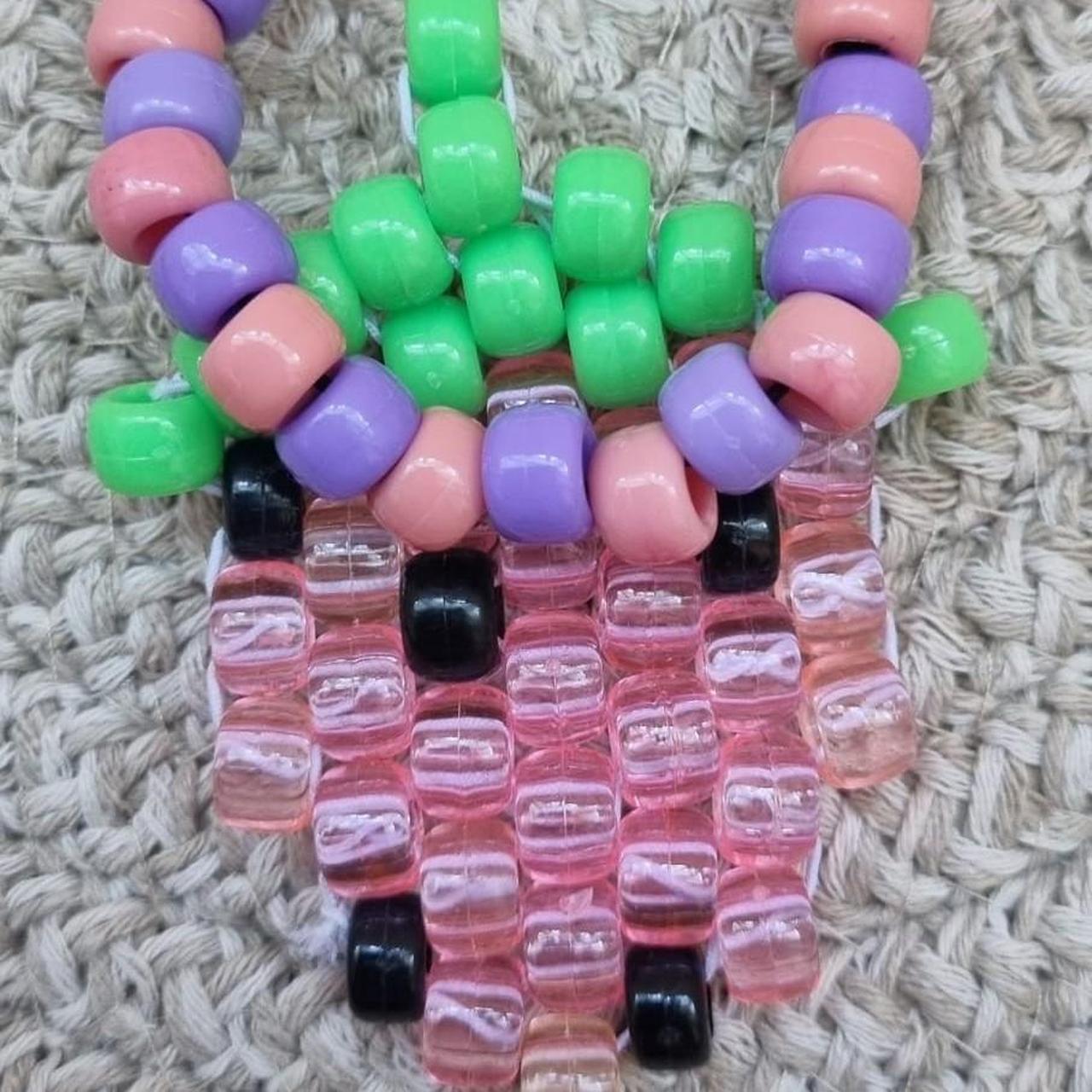 Handmade pink and purple kandi bracelet with large... - Depop