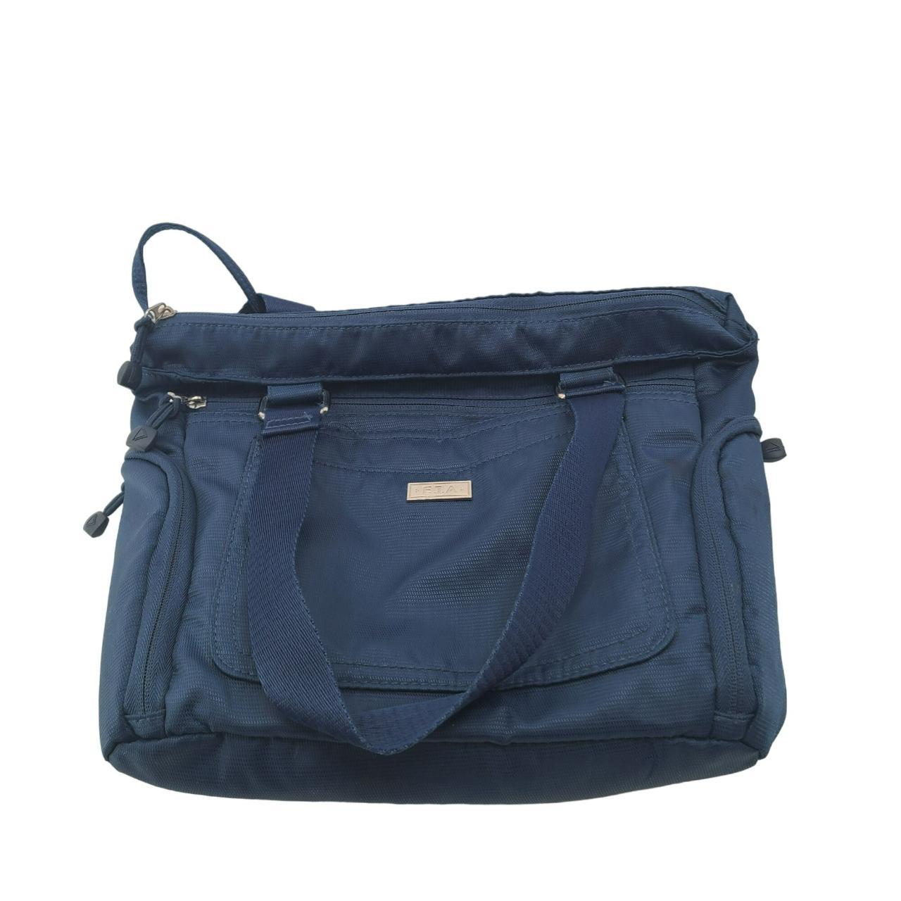 E.T.A Blue Black Side Pockets Zip Close Padded... - Depop