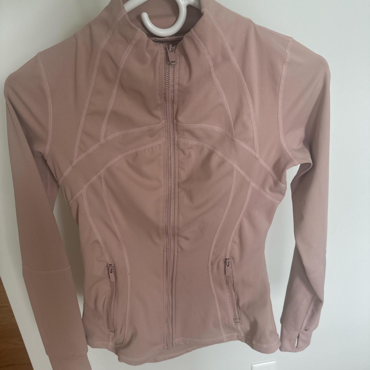 Light pink zip-up jacket with thumb holes... | Depop