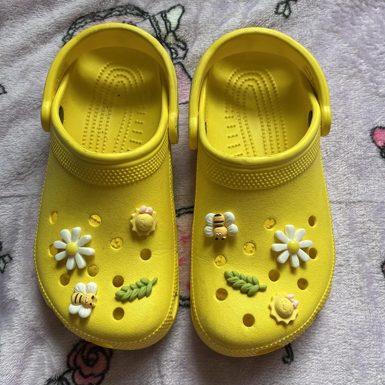Yellow Crocs clogs with flower and bee charms size... - Depop