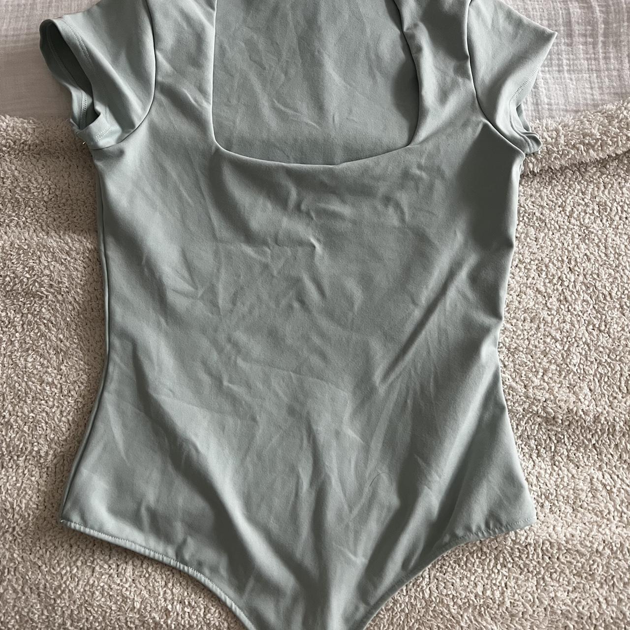 Free people square neck body suit Worn a few times... - Depop
