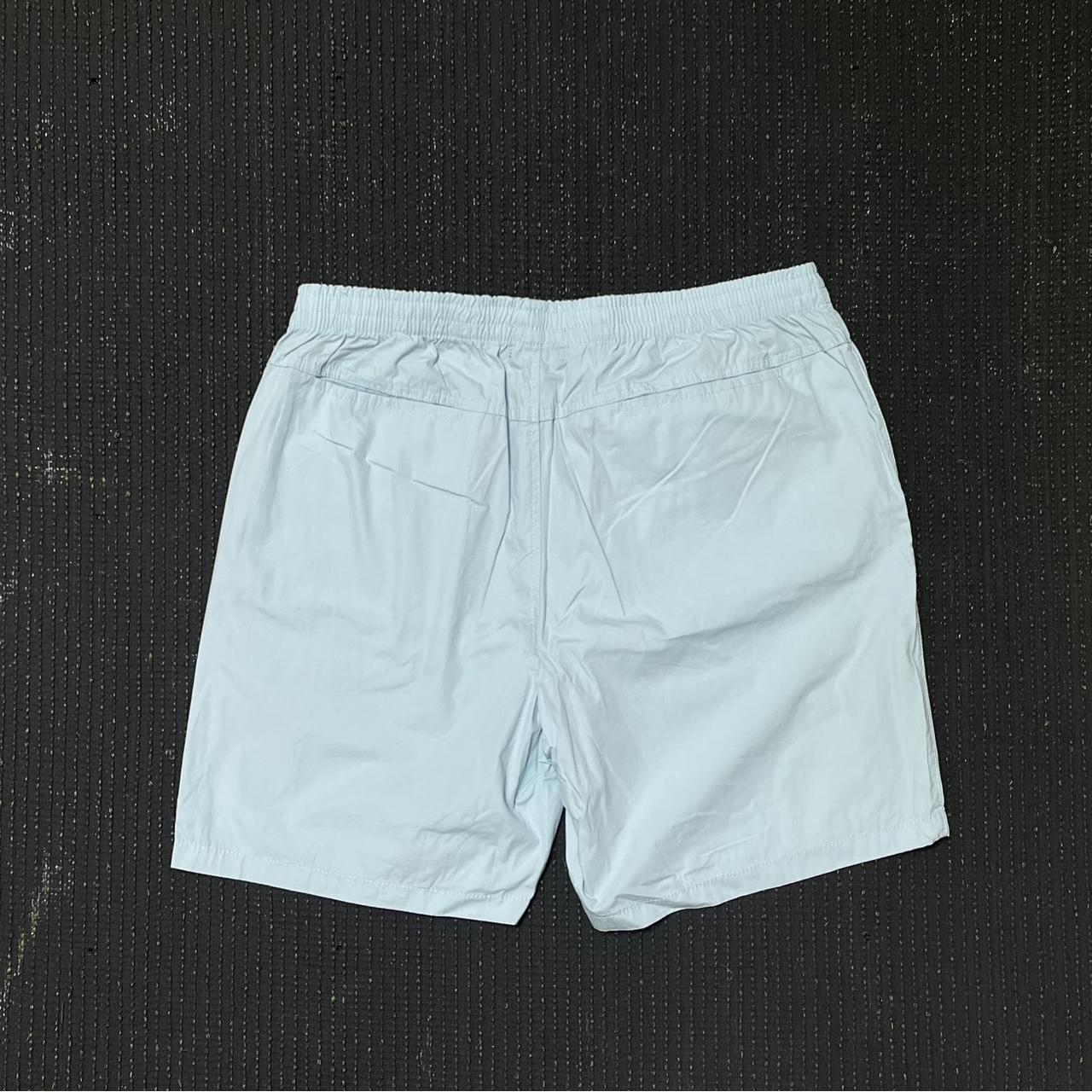 Stüssy Men's Black and Blue Shorts | Depop