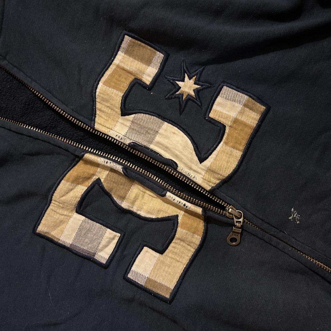 vintage navy zip-up DC with fun plaid design on the... | Depop