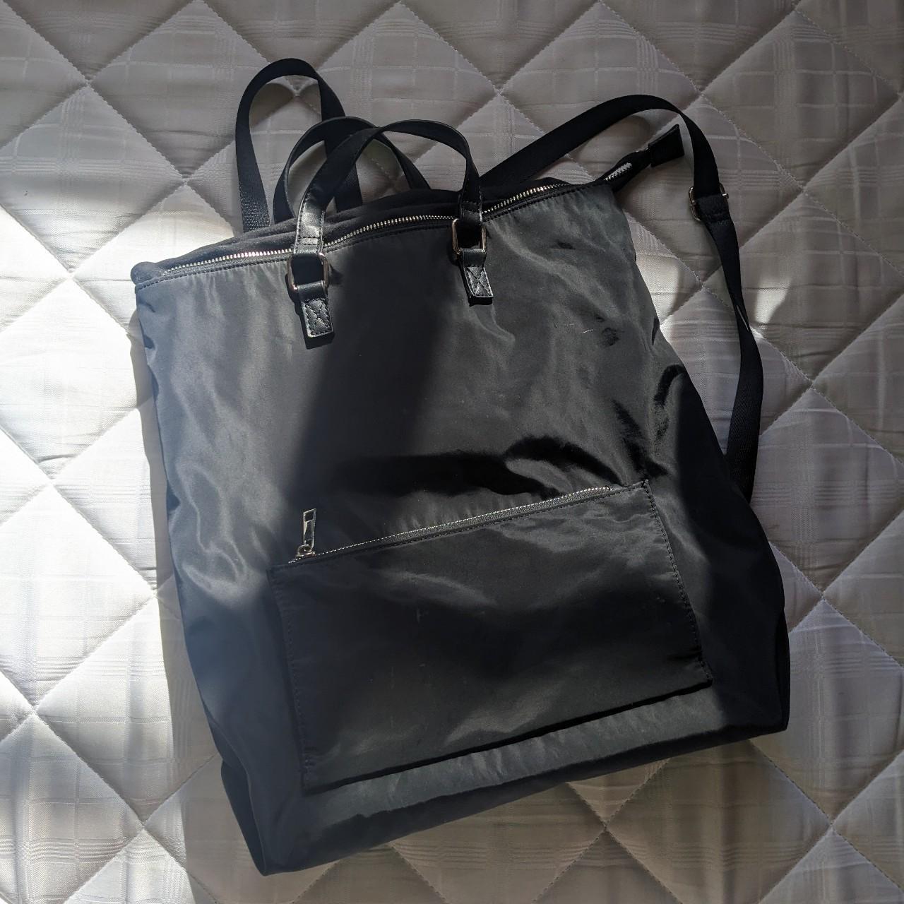 Lightweight stylish black backpack. This has a water... - Depop