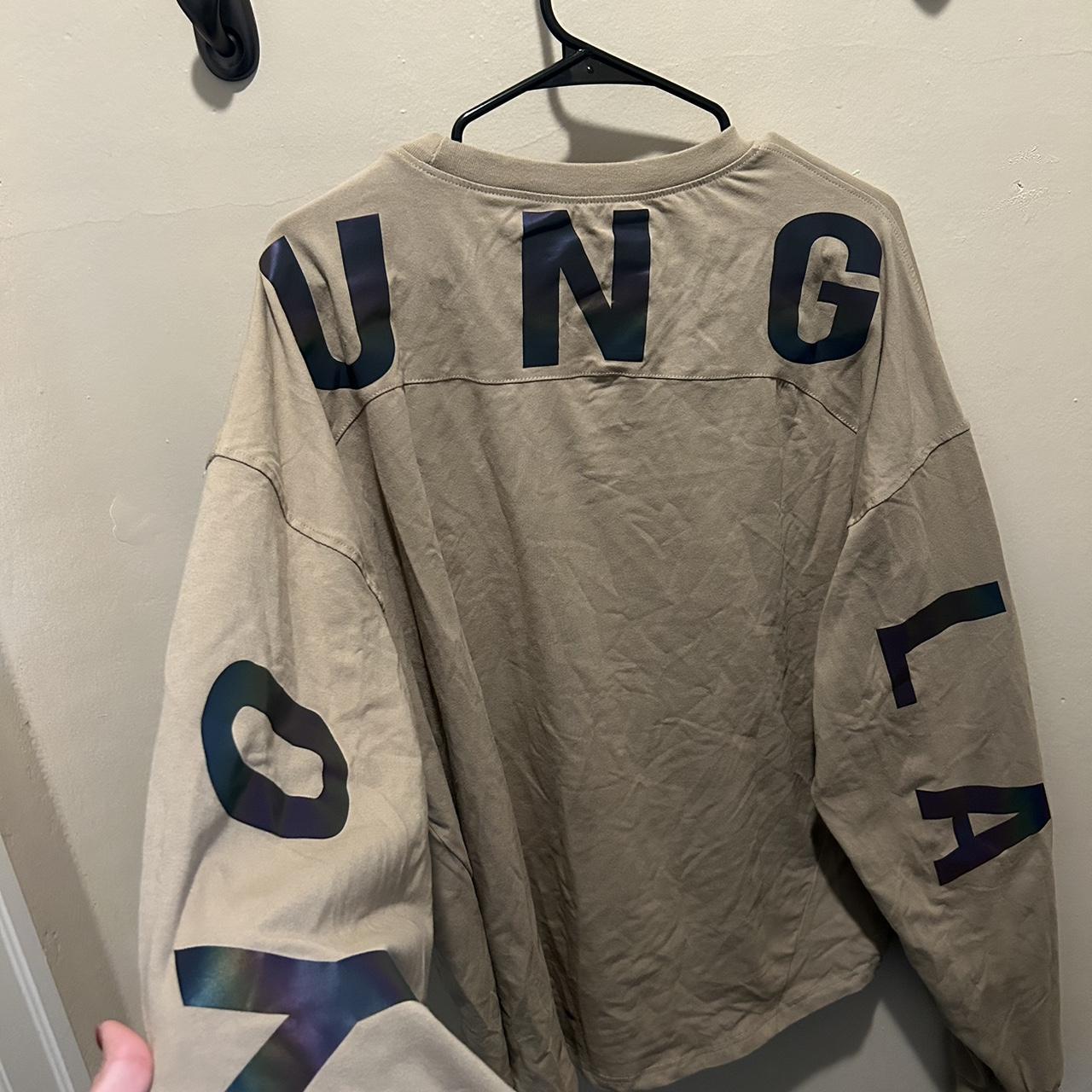 Tan holographic back youngla shirt Size large,... - Depop