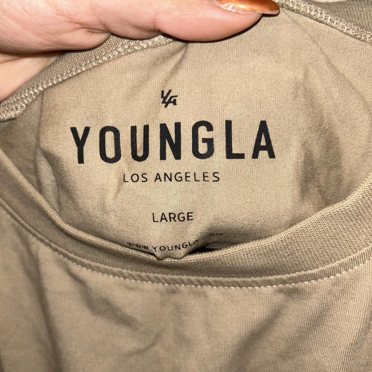 Tan holographic back youngla shirt Size large,... - Depop