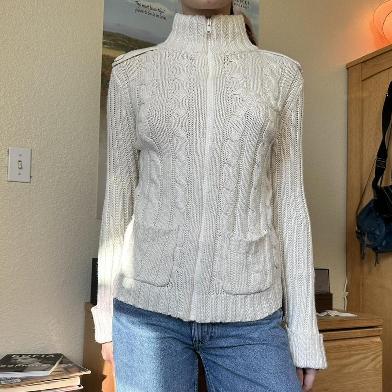 Adorable white zip up sweater. Has pockets in the... - Depop