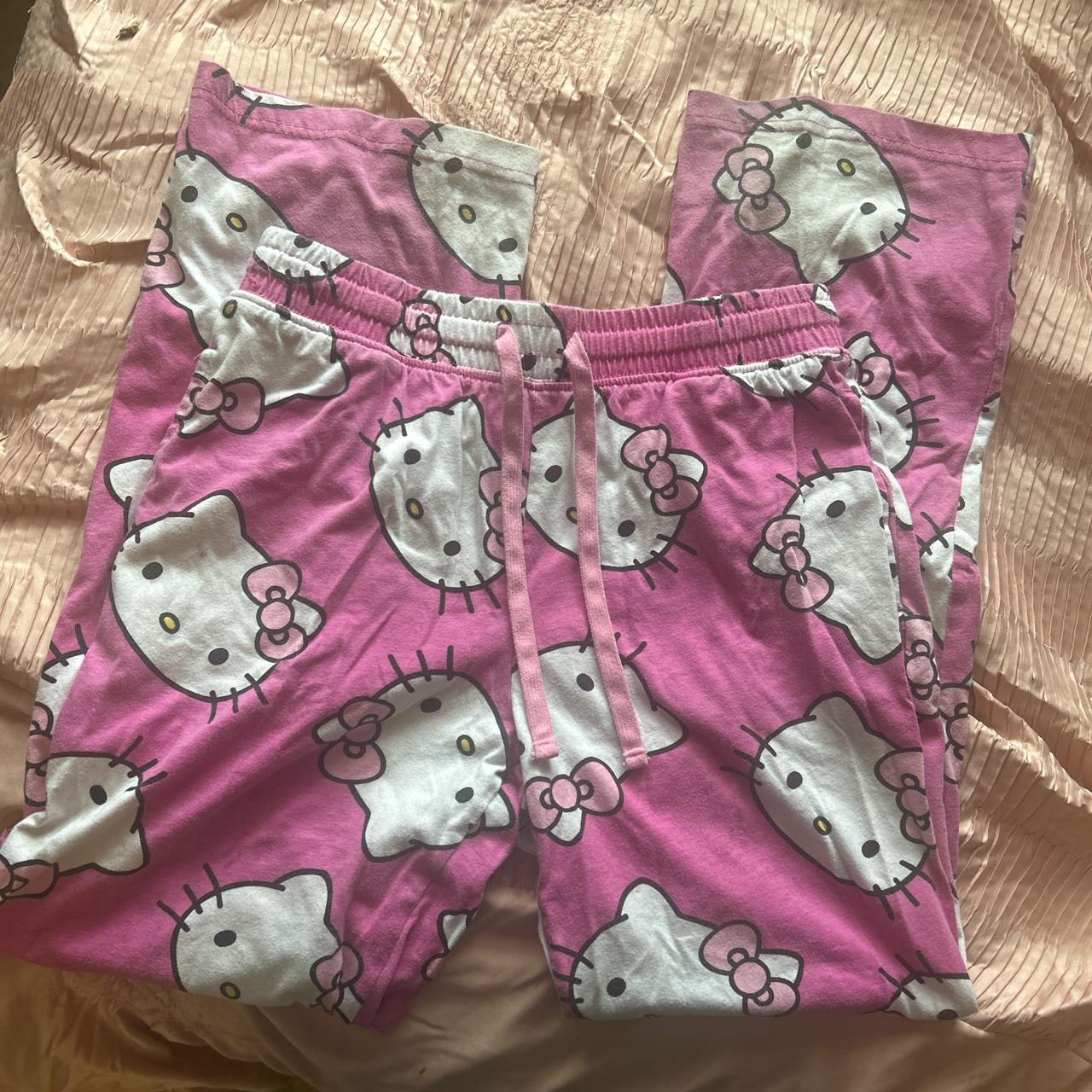 Pink hello kitty pajama pants, size M, i got them at... - Depop