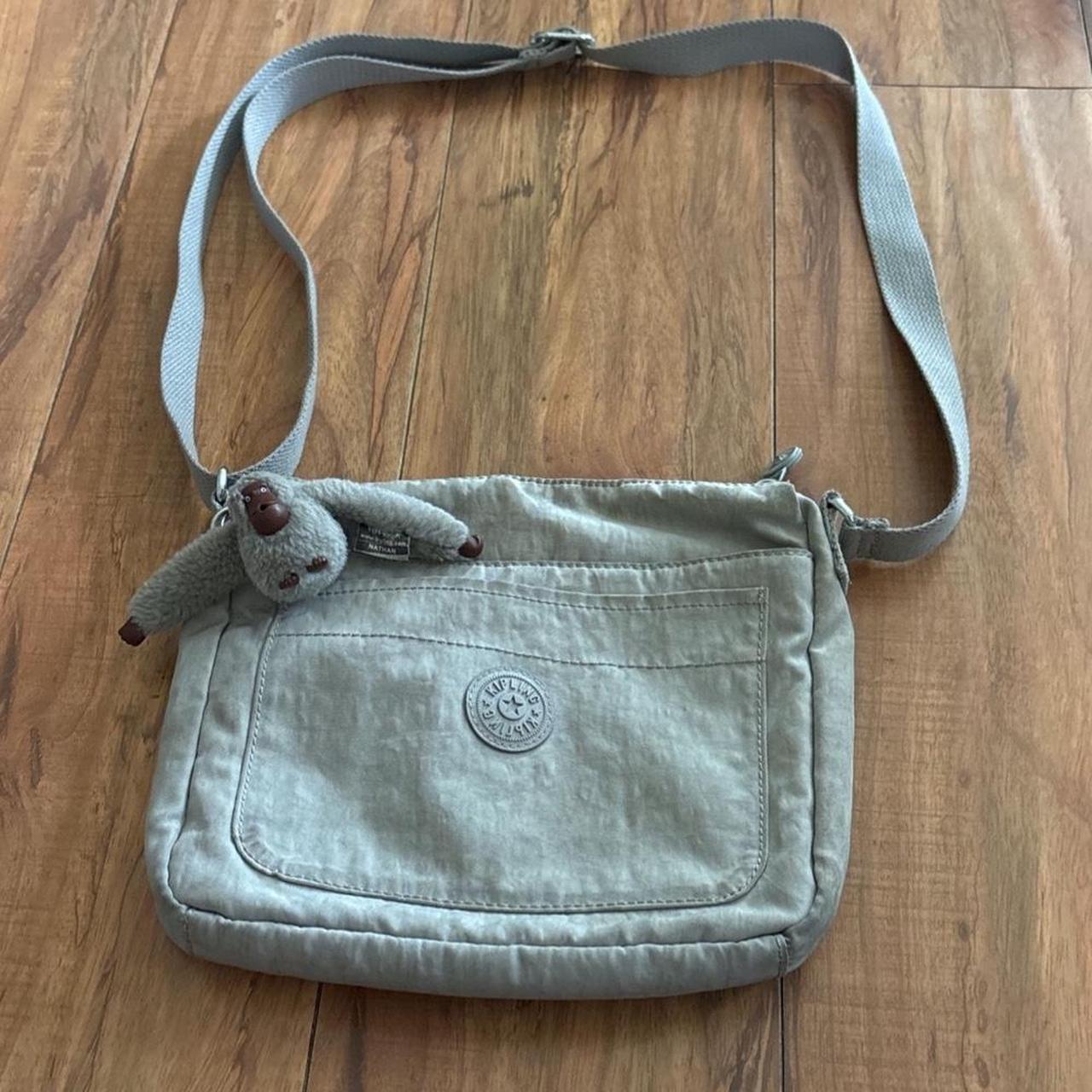 Light Gray Kipling crossbody bag with monkey charm... - Depop