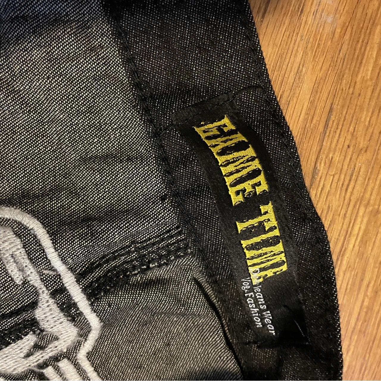 game time black baggy jeans with designs size... - Depop