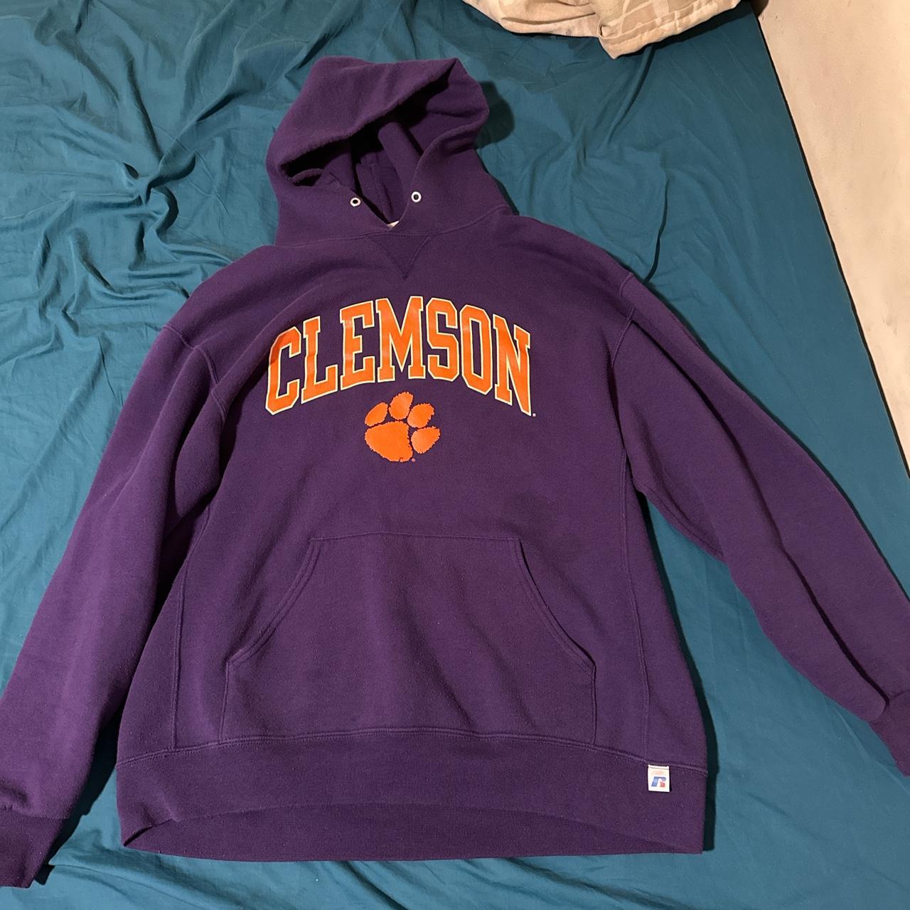 Purple Clemson hoodie, a little wear and tear on... - Depop