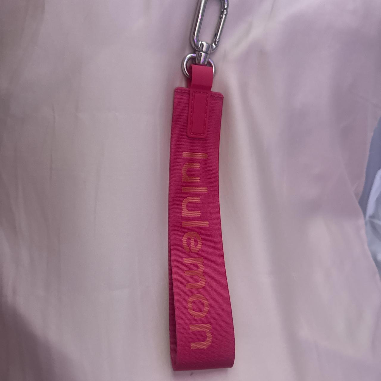 Pink Lululemon never lost keychain, never used... | Depop