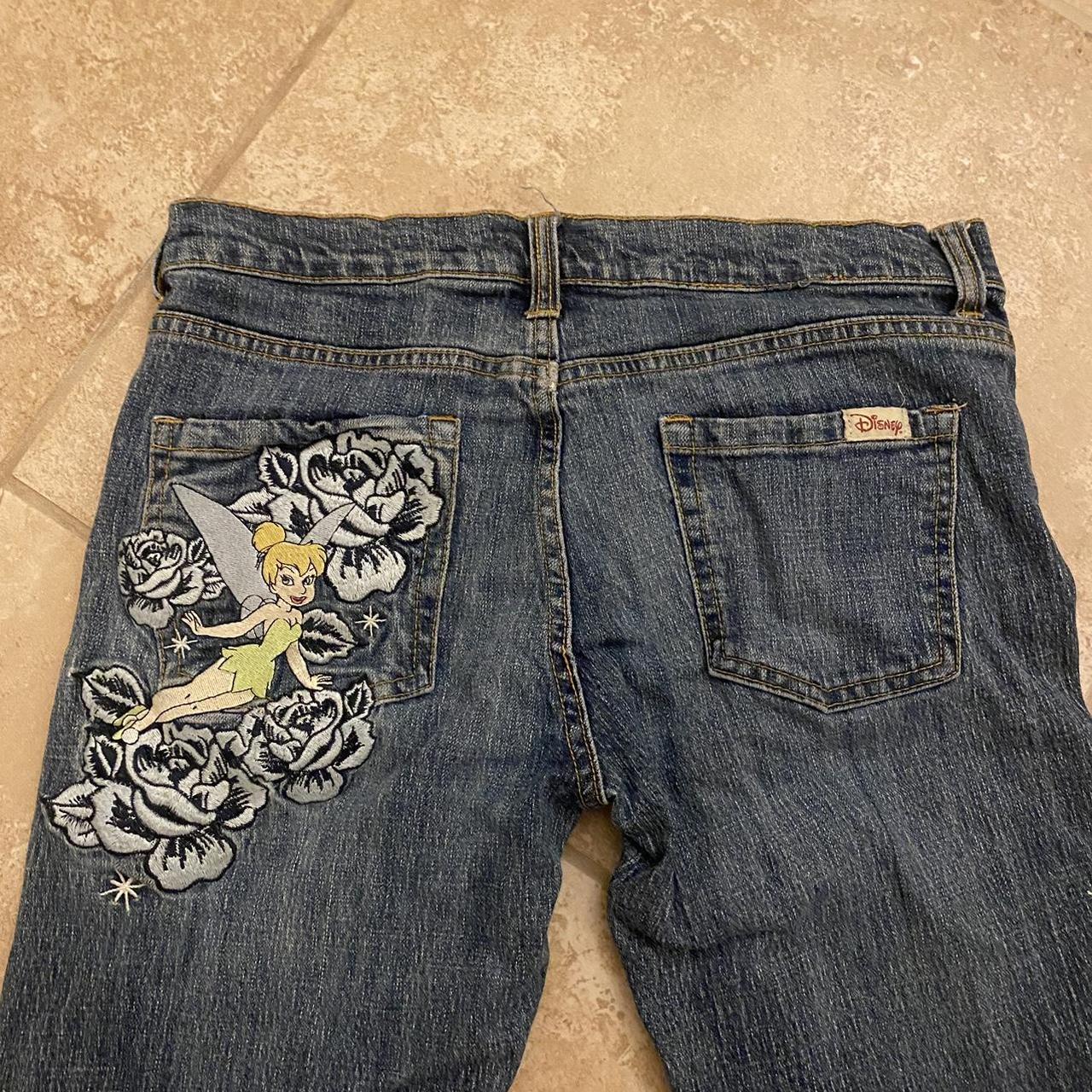 Disney Tinkerbell low rise jeans Fit 5’5 and... - Depop