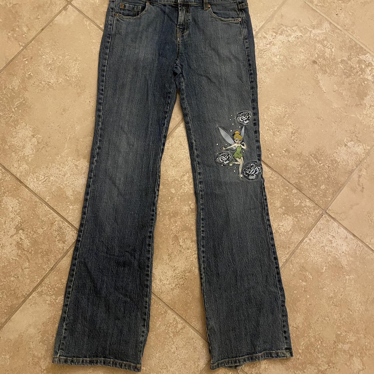 Disney Tinkerbell low rise jeans Fit 5’5 and... - Depop
