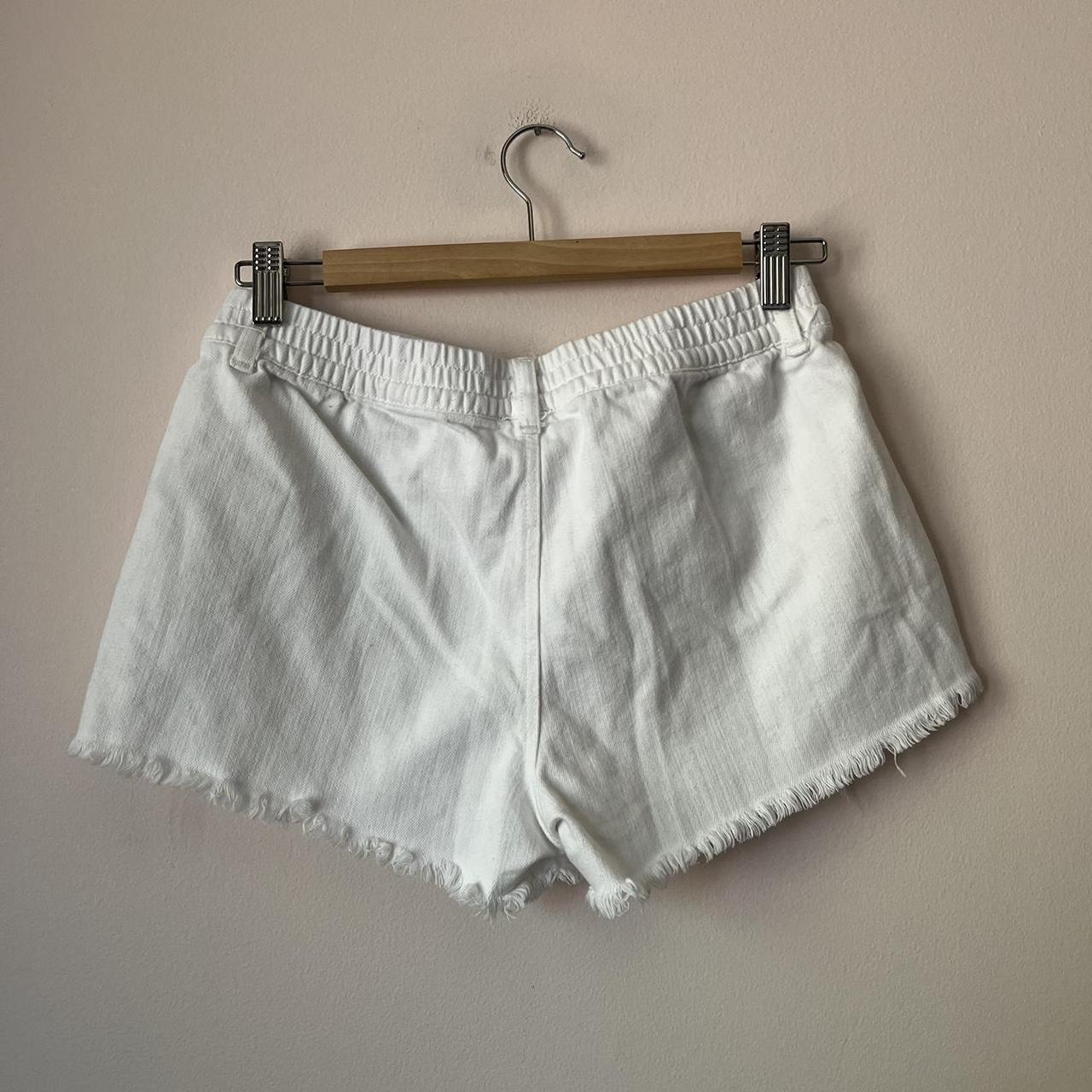 Aerie White pull on shorts Raw hem, distressing on... - Depop