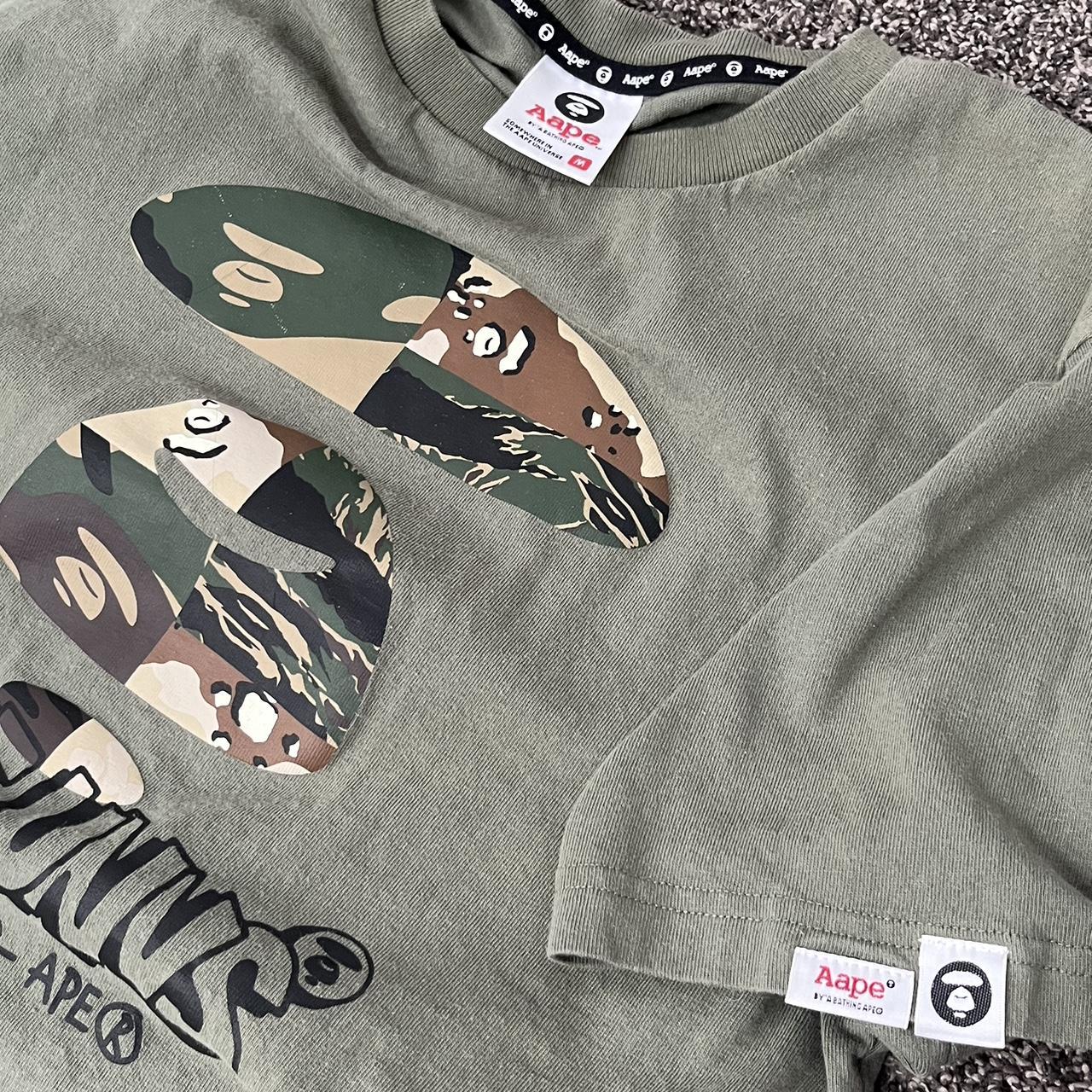 a bathing ape aape unvs green camo graphic t... - Depop