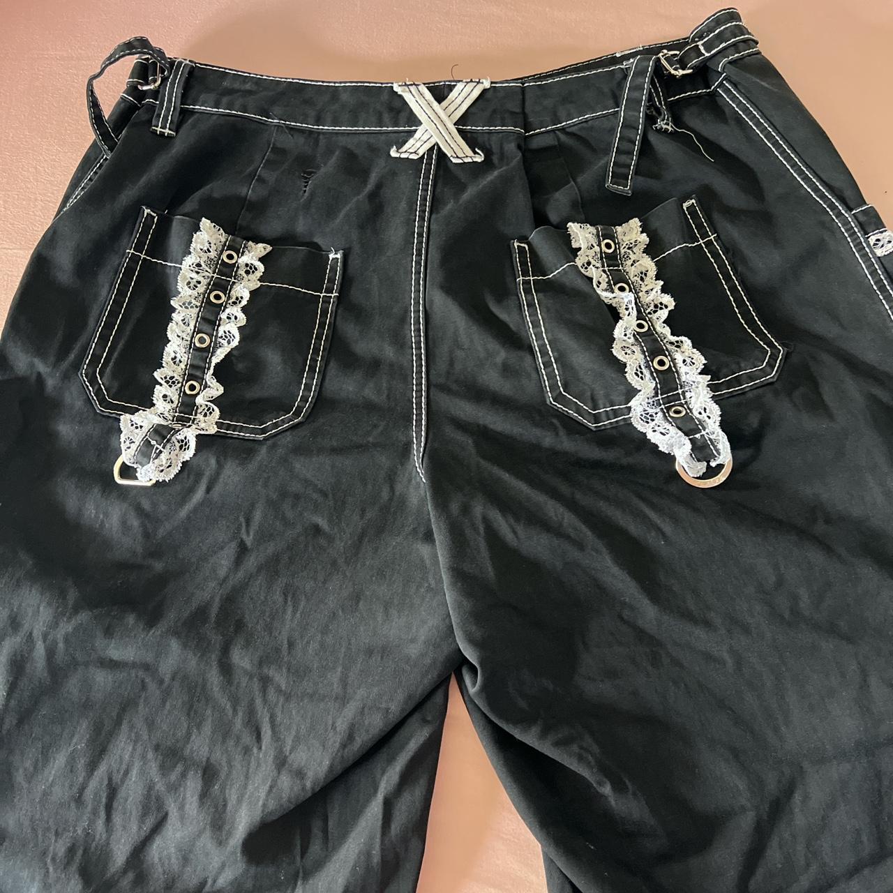 Black Tripp nyc pants with cute white lace on the... - Depop
