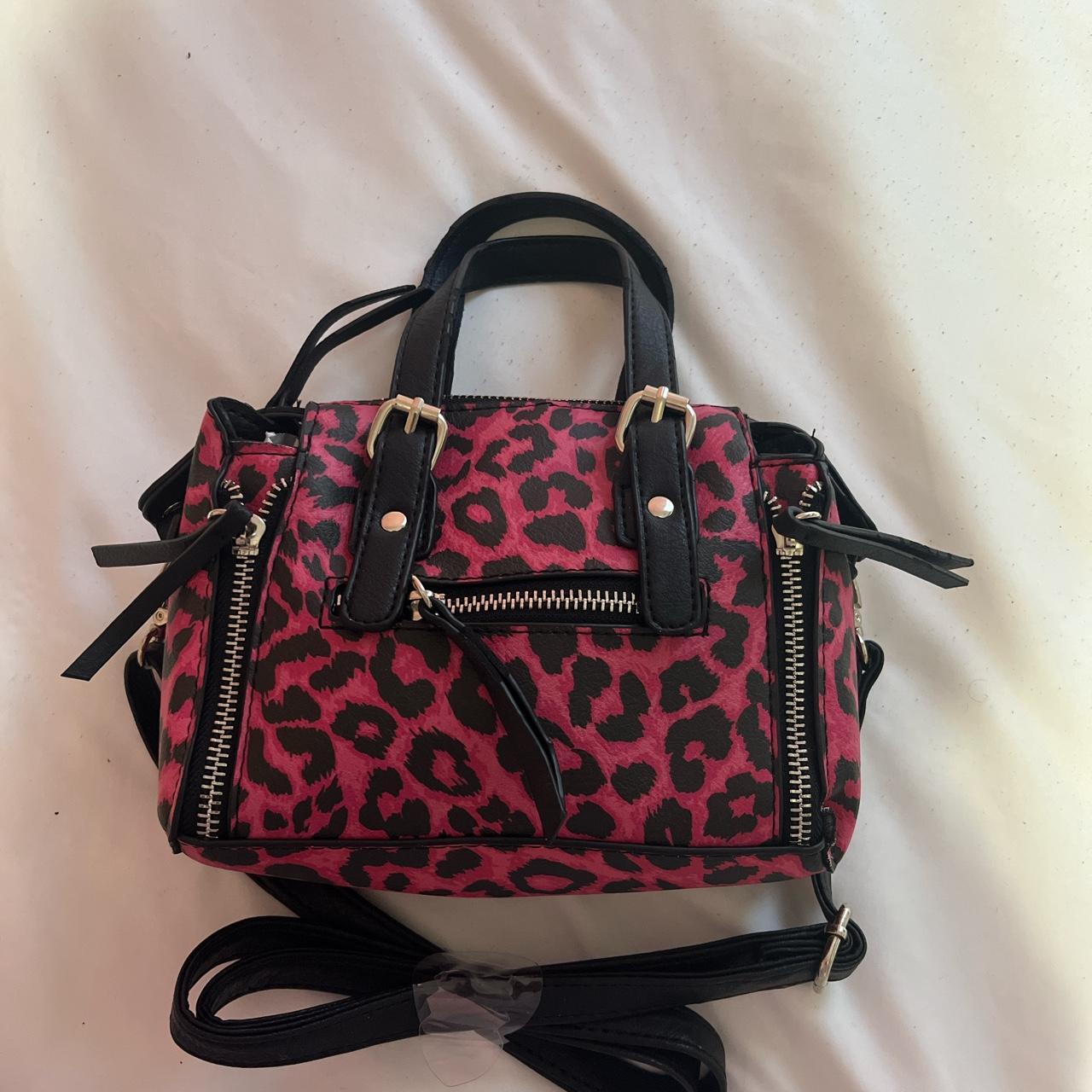 pink crossbody cheetah print bag with black... - Depop