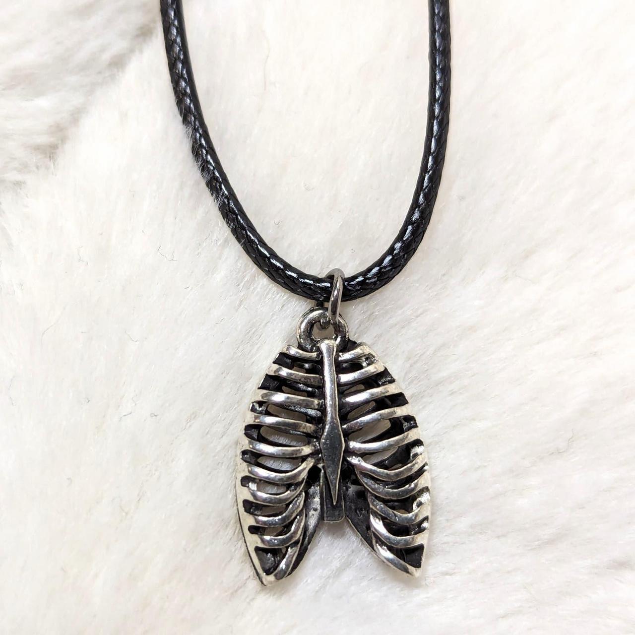 Gothic Style Rib Cage Silver Charm on a Black Rope... - Depop