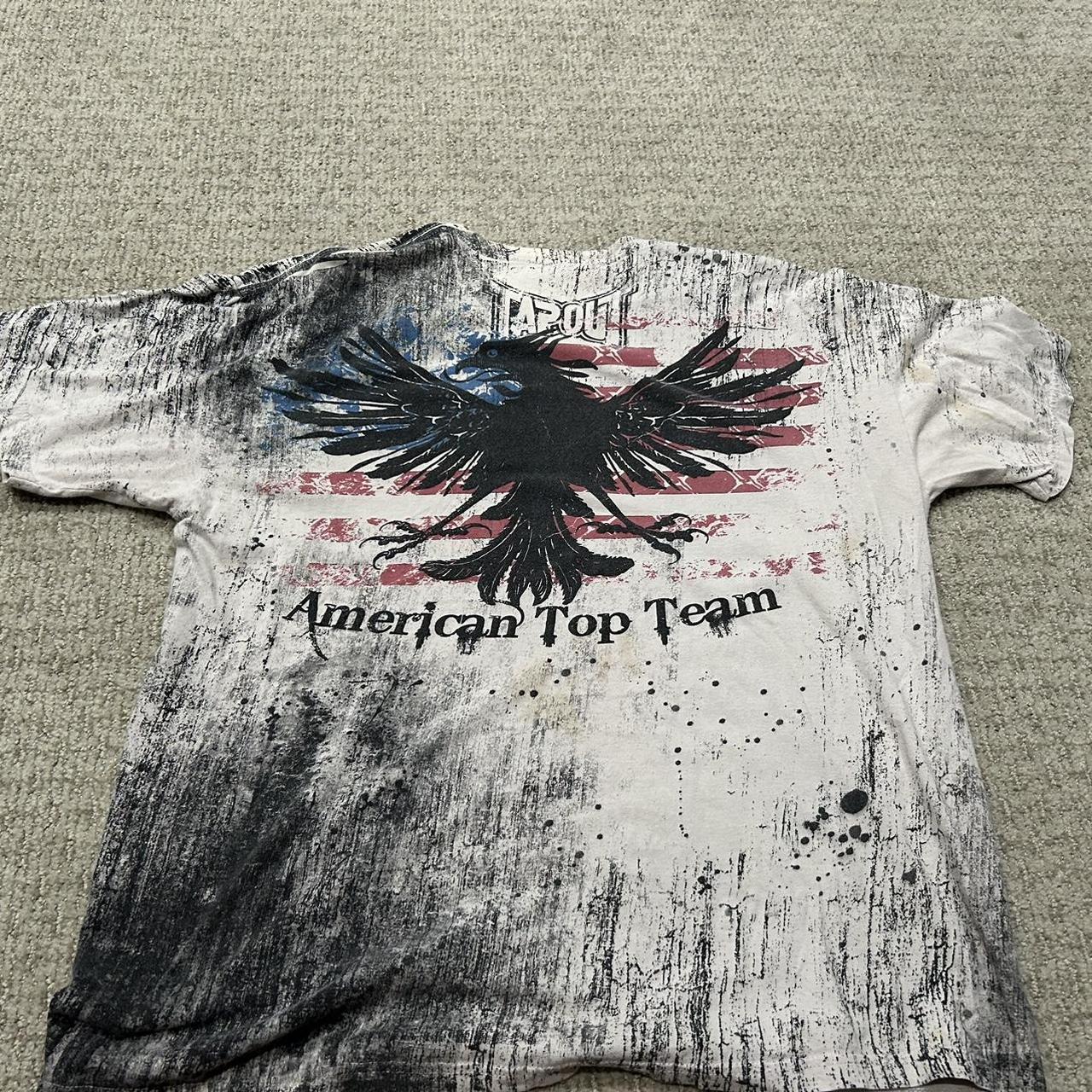 Tap out black and white t-shirt AMERICA RAHHHH type... - Depop